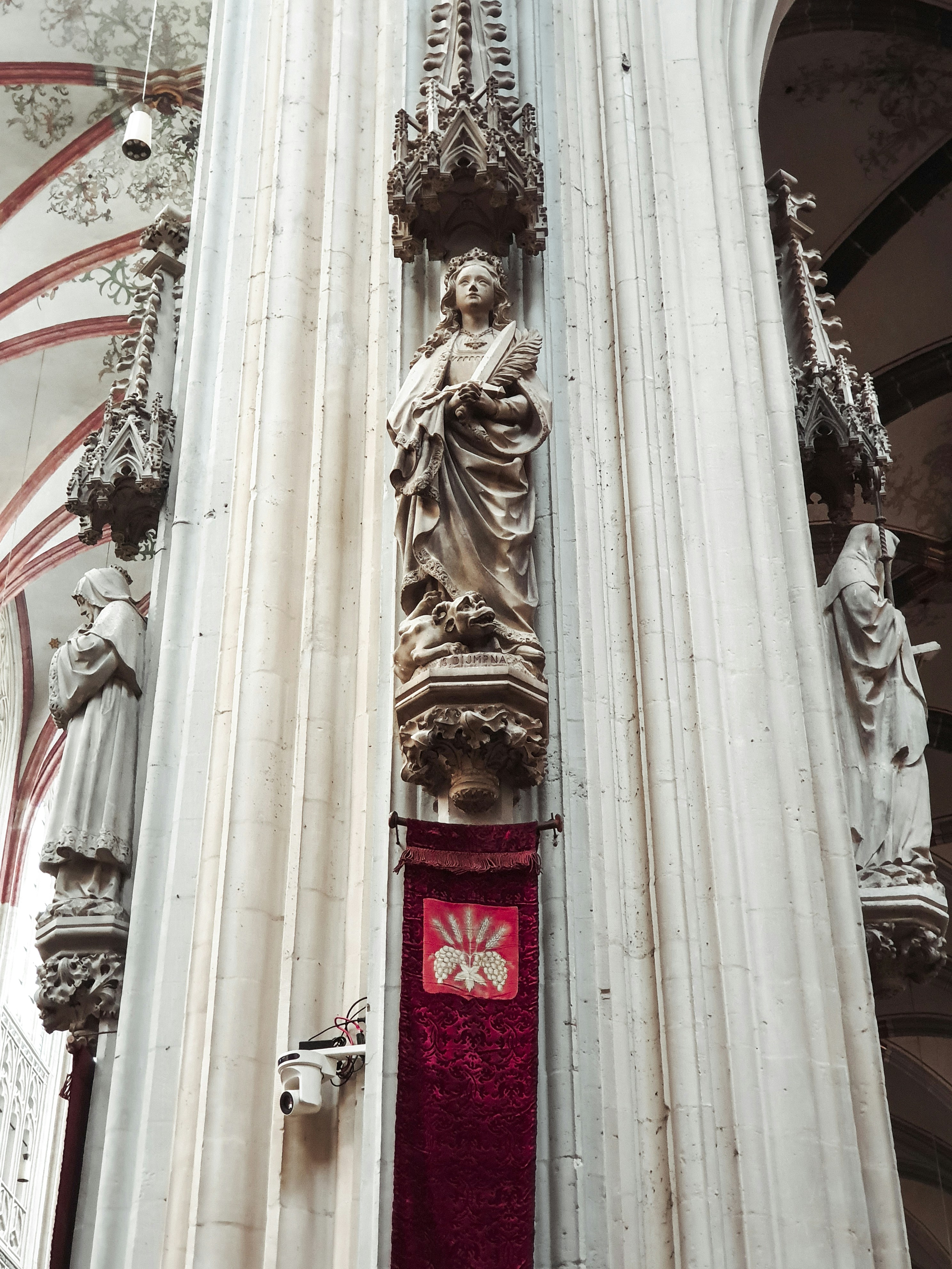 A tall building with a clock on the side of it photo – Free City Image ...