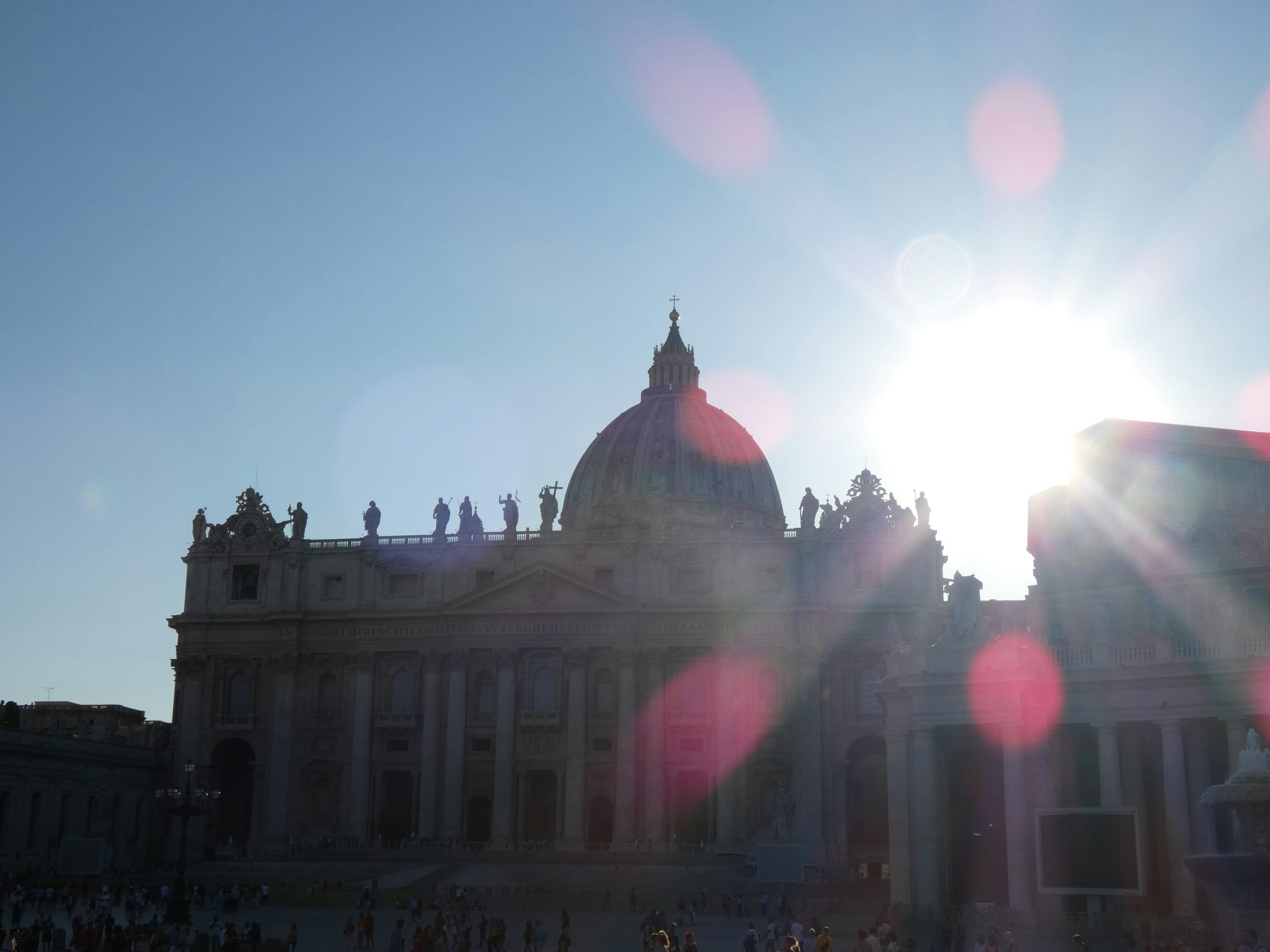 Dome Silhouette: Saint Peter's Basilica Beneath a Radiant Noon