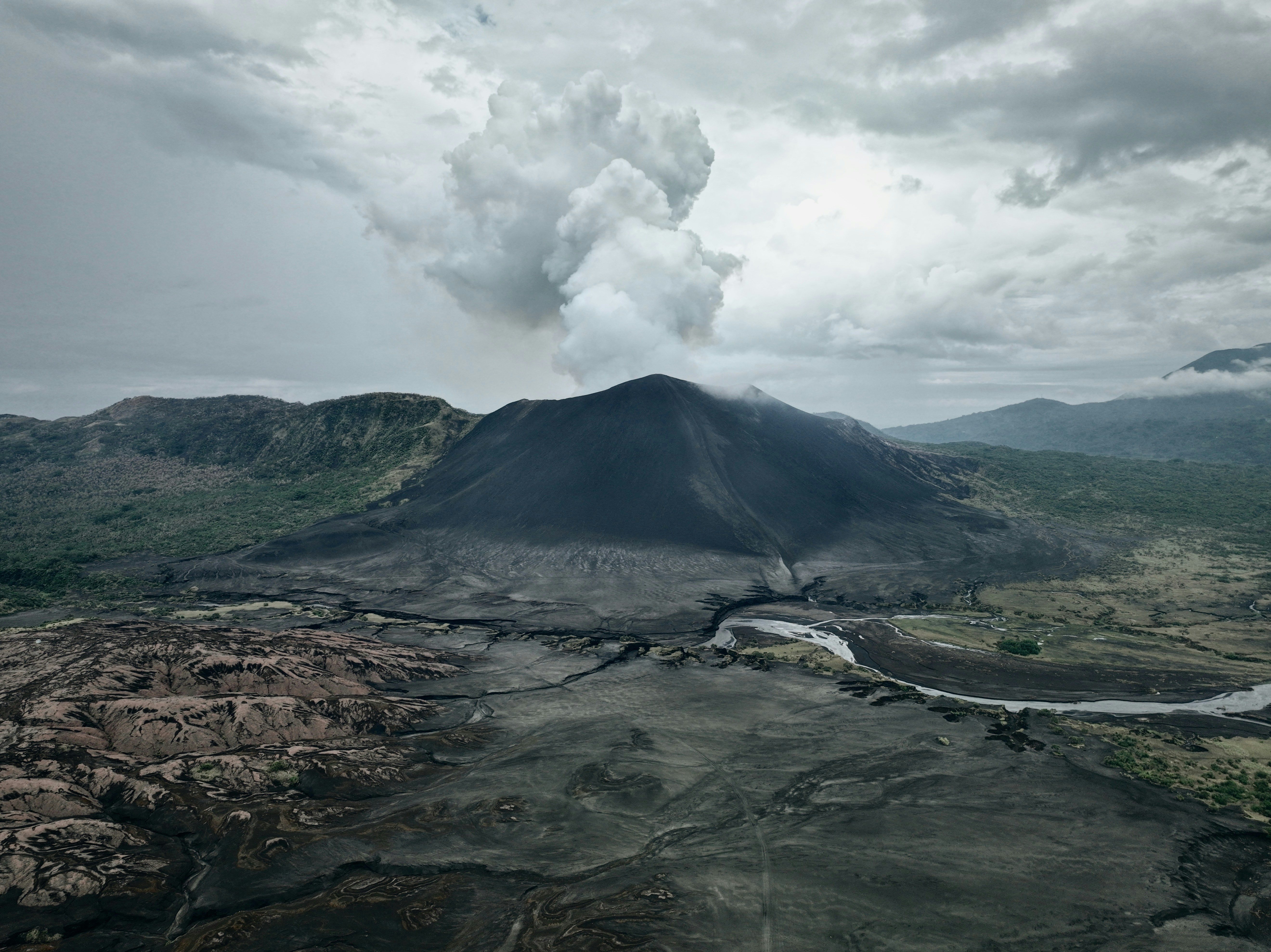 Crater Crown: A Drone Portrait of a Smoky Volcanic Peak