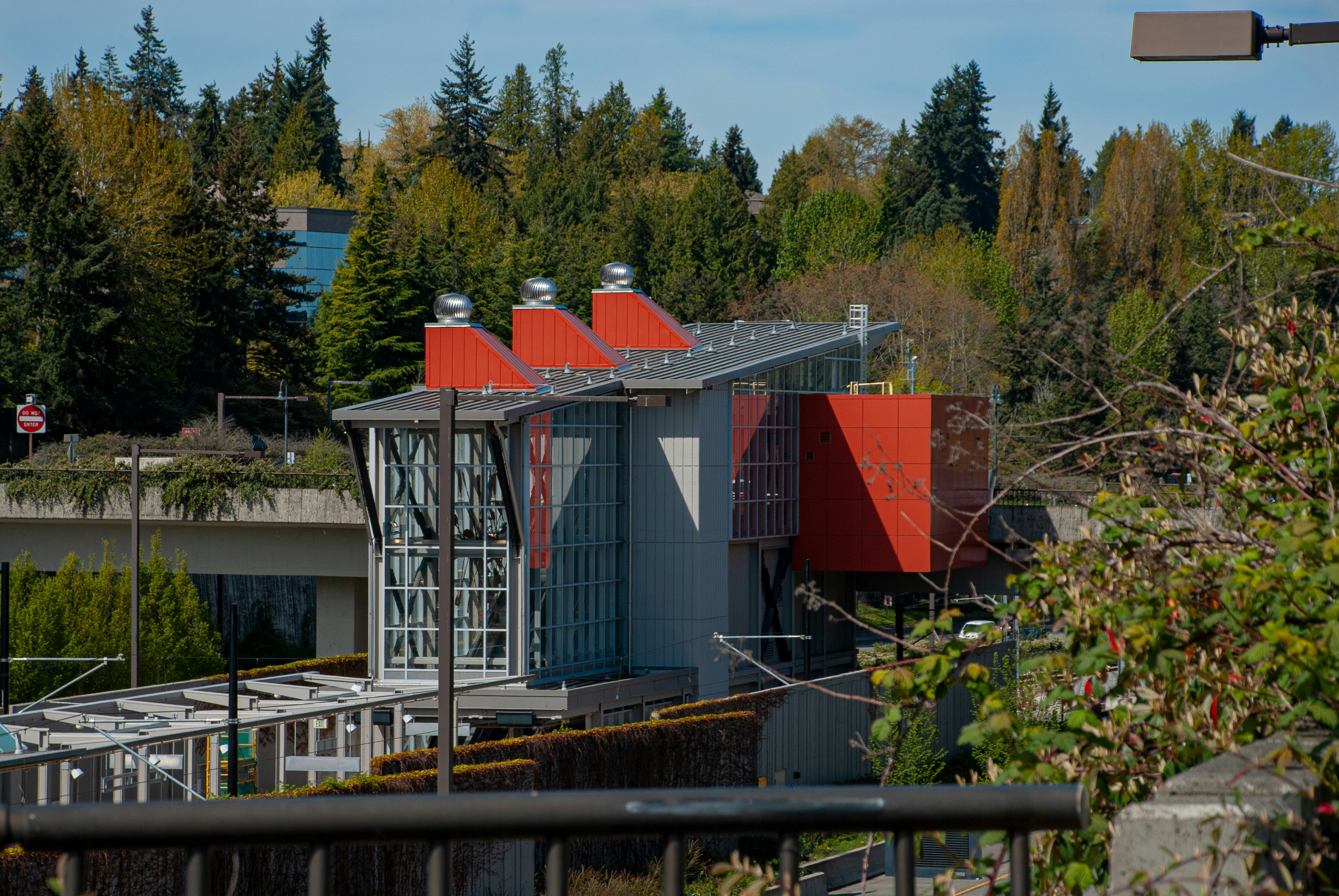A train station with red and white buildings photo – Free Mercer island ...