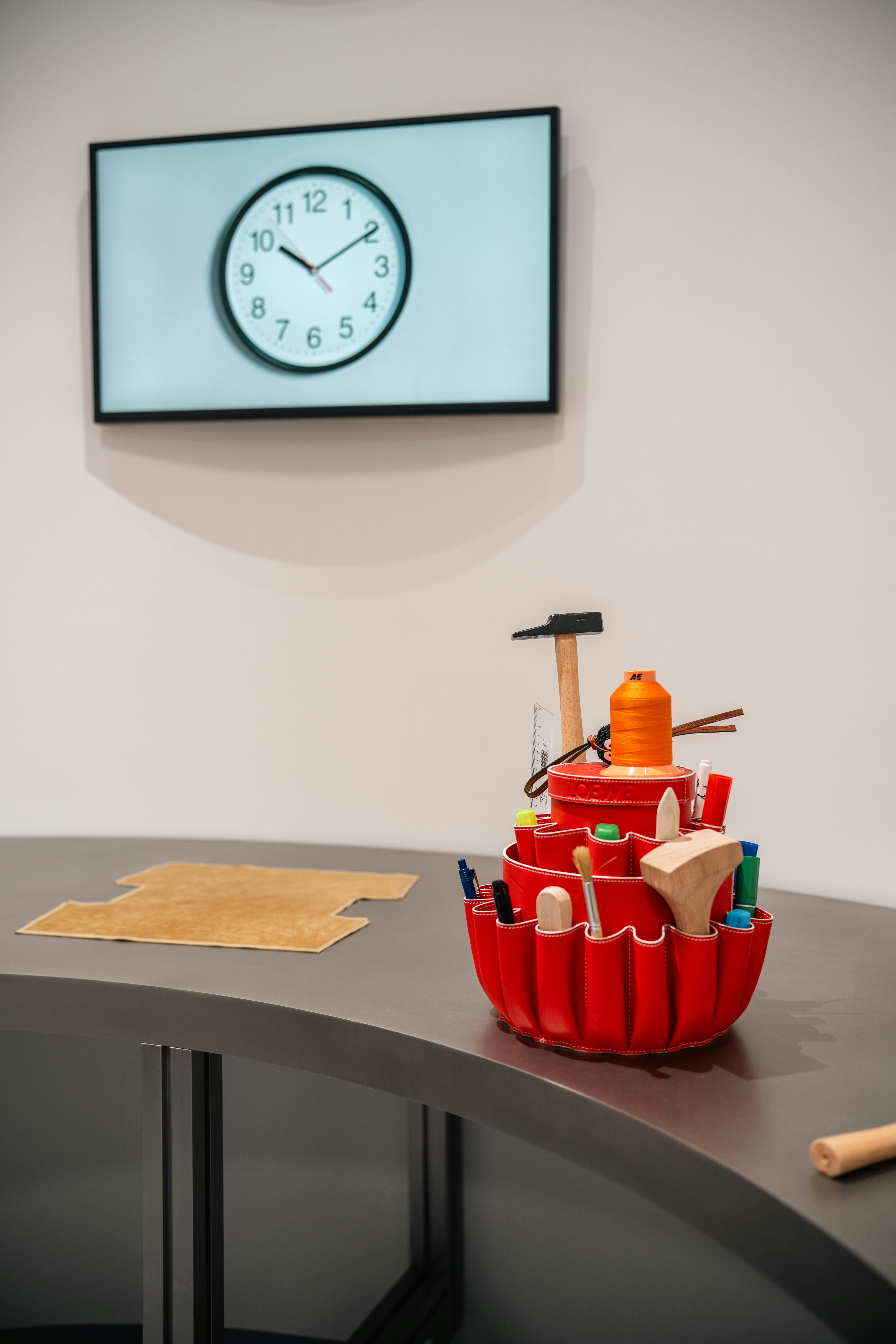 Red Tool Caddy Under a Quiet Clock: A Minimal Workbench Moment