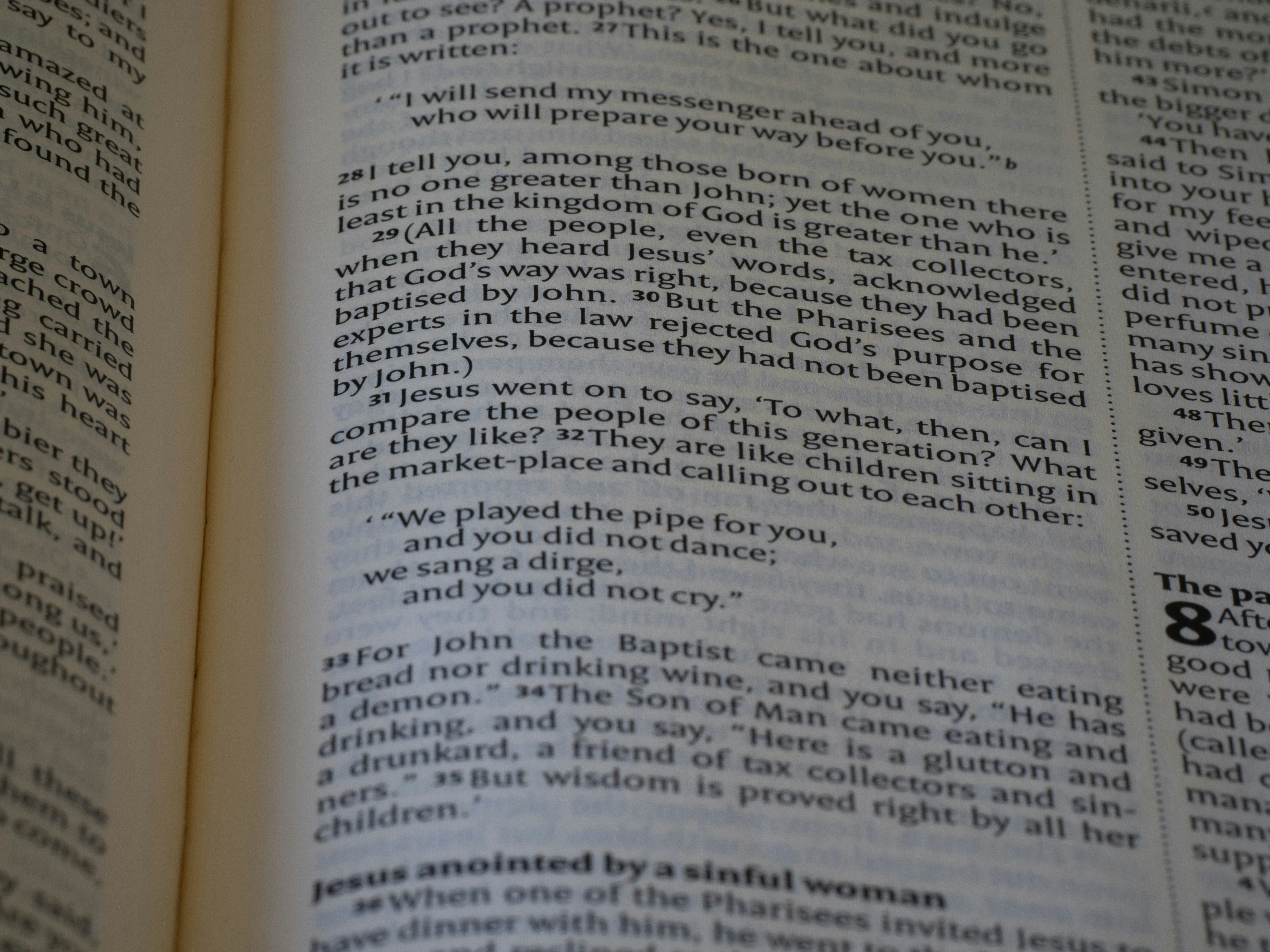 Macro Look at Biblical Verse Fragments on a Worn Page