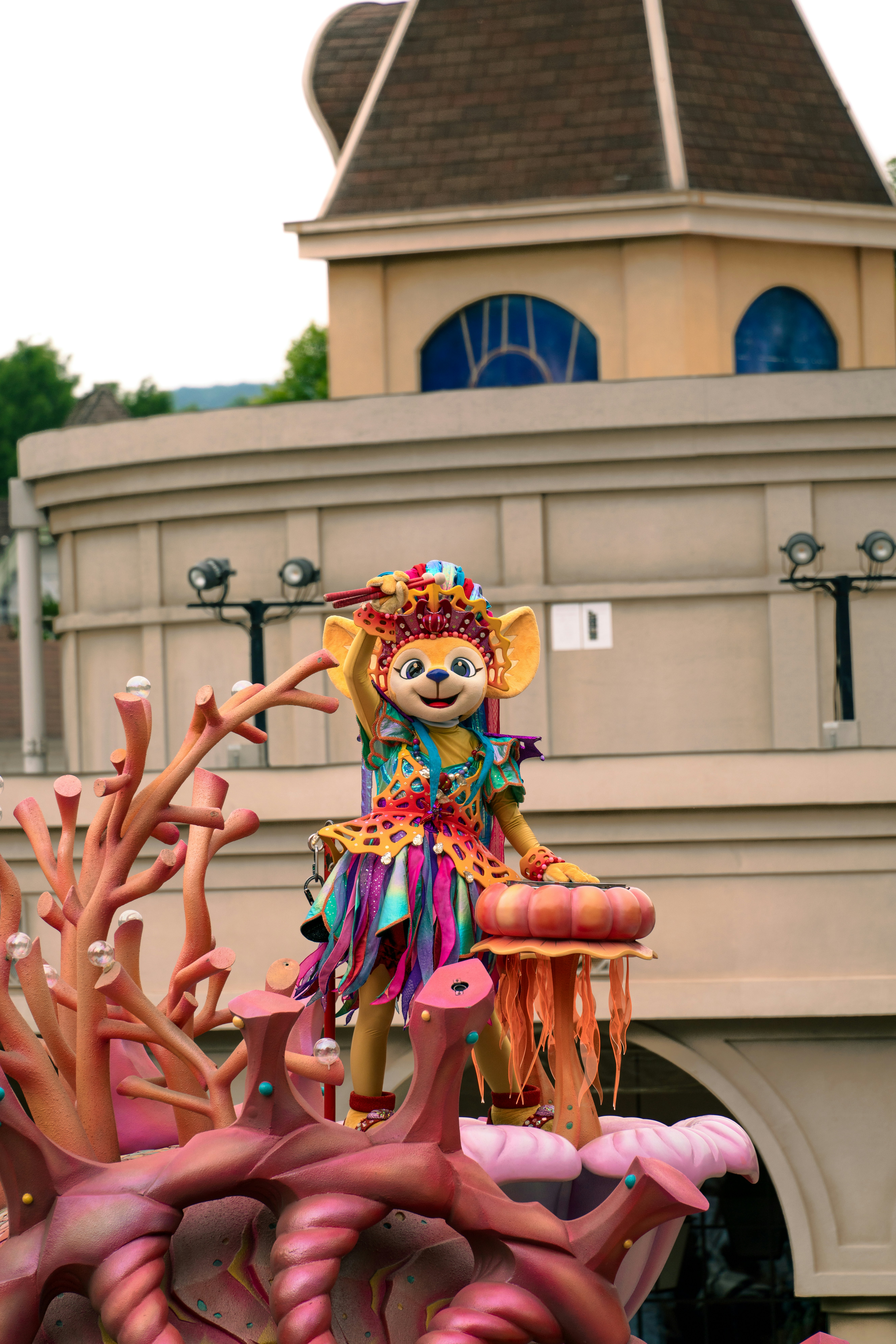 A statue of a clown on top of a building photo – Free Event Image on ...