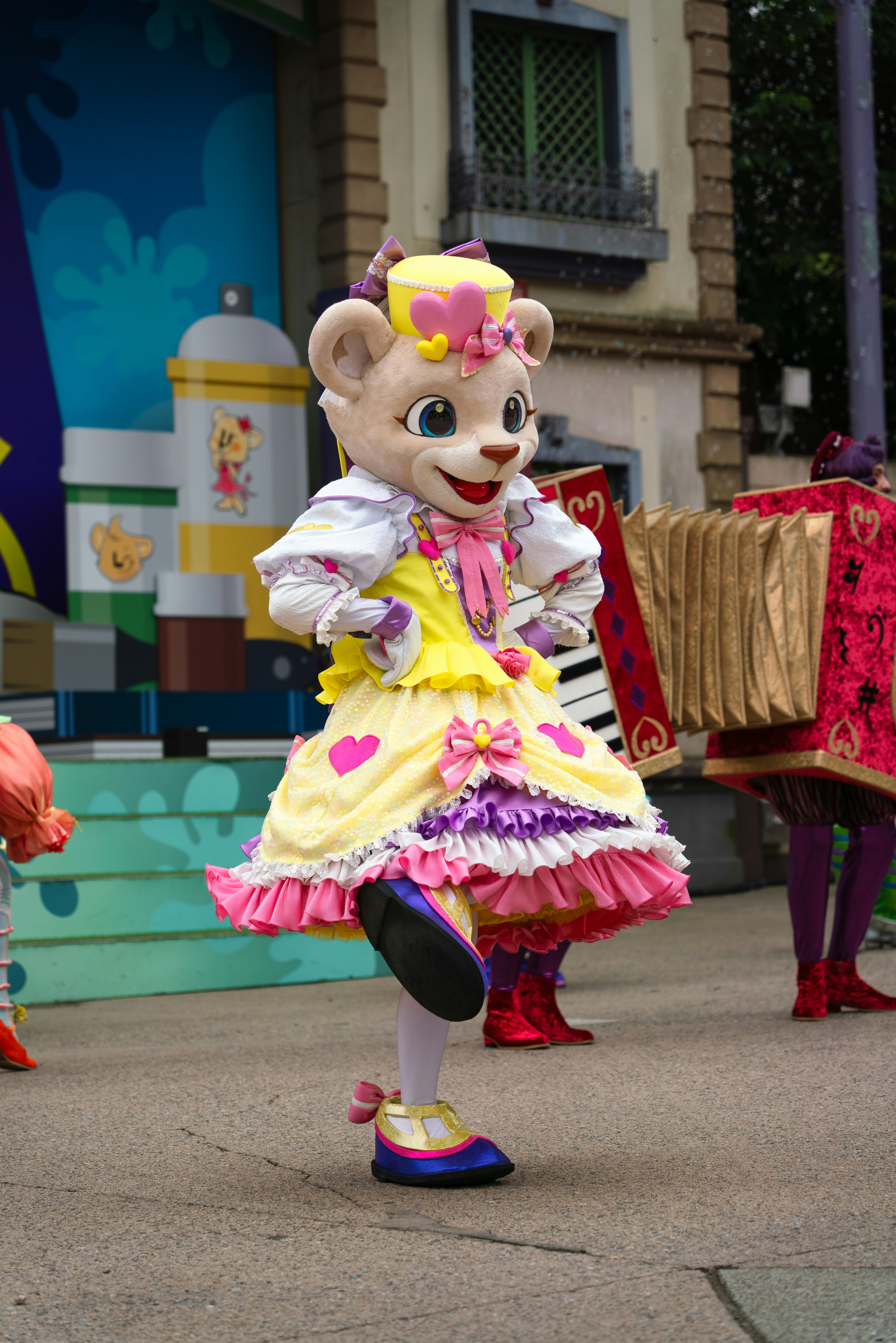 Pastel Parade Mouse: A Lively Mascot in a Candy-Tinted Dress