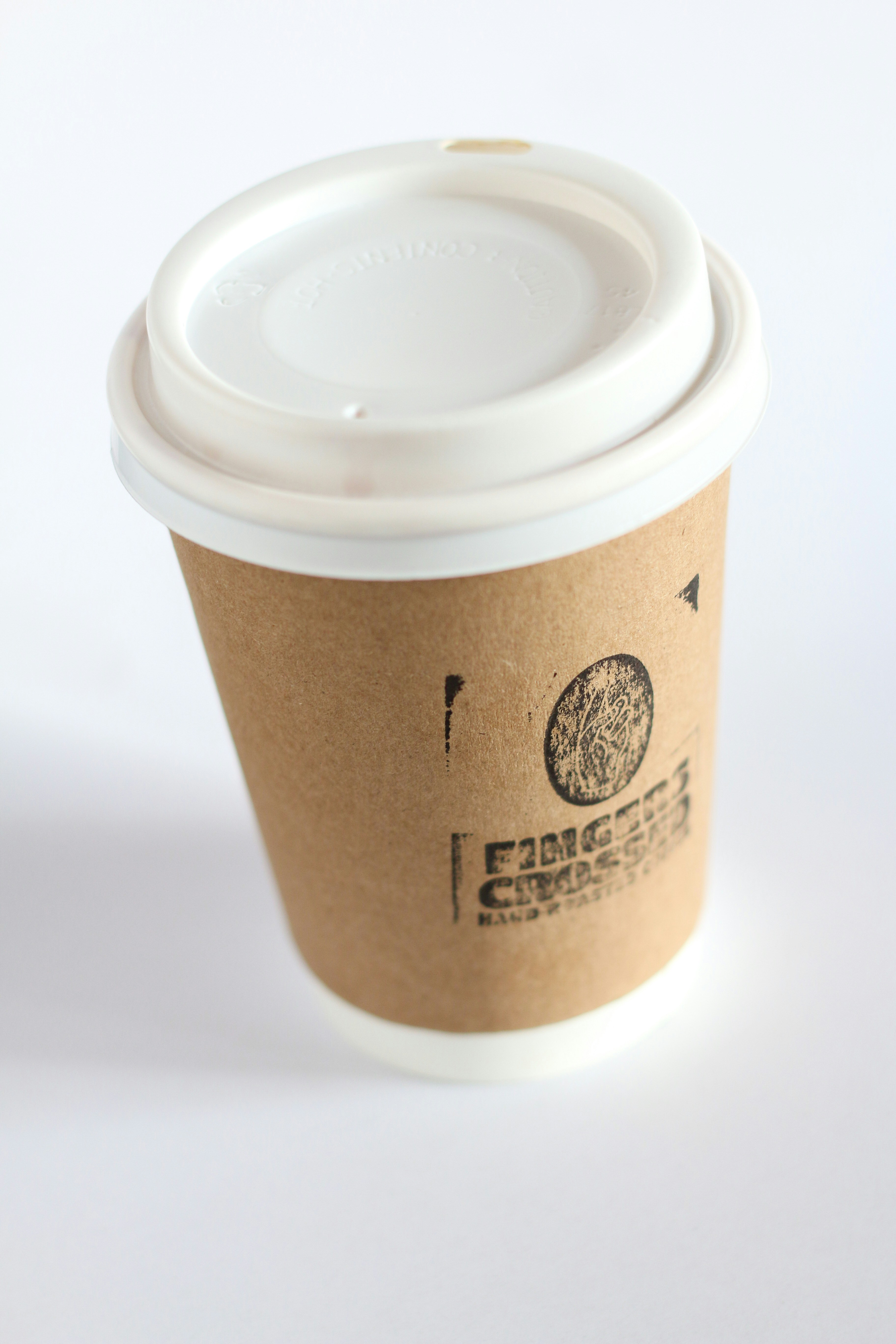 Paper Cup Calm: Focused on a Minimalist Coffee Pod