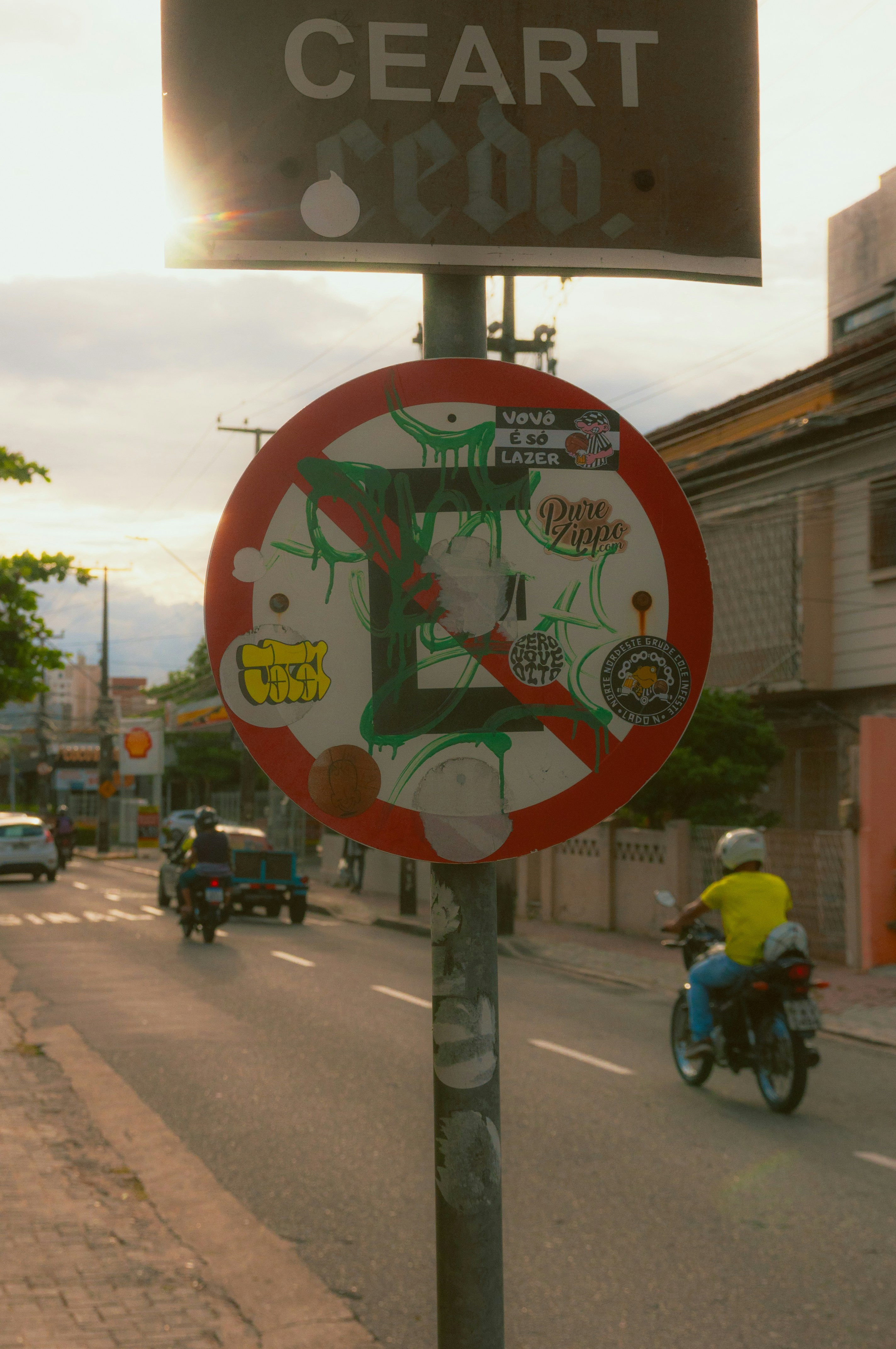 A street sign on a pole on the side of the road