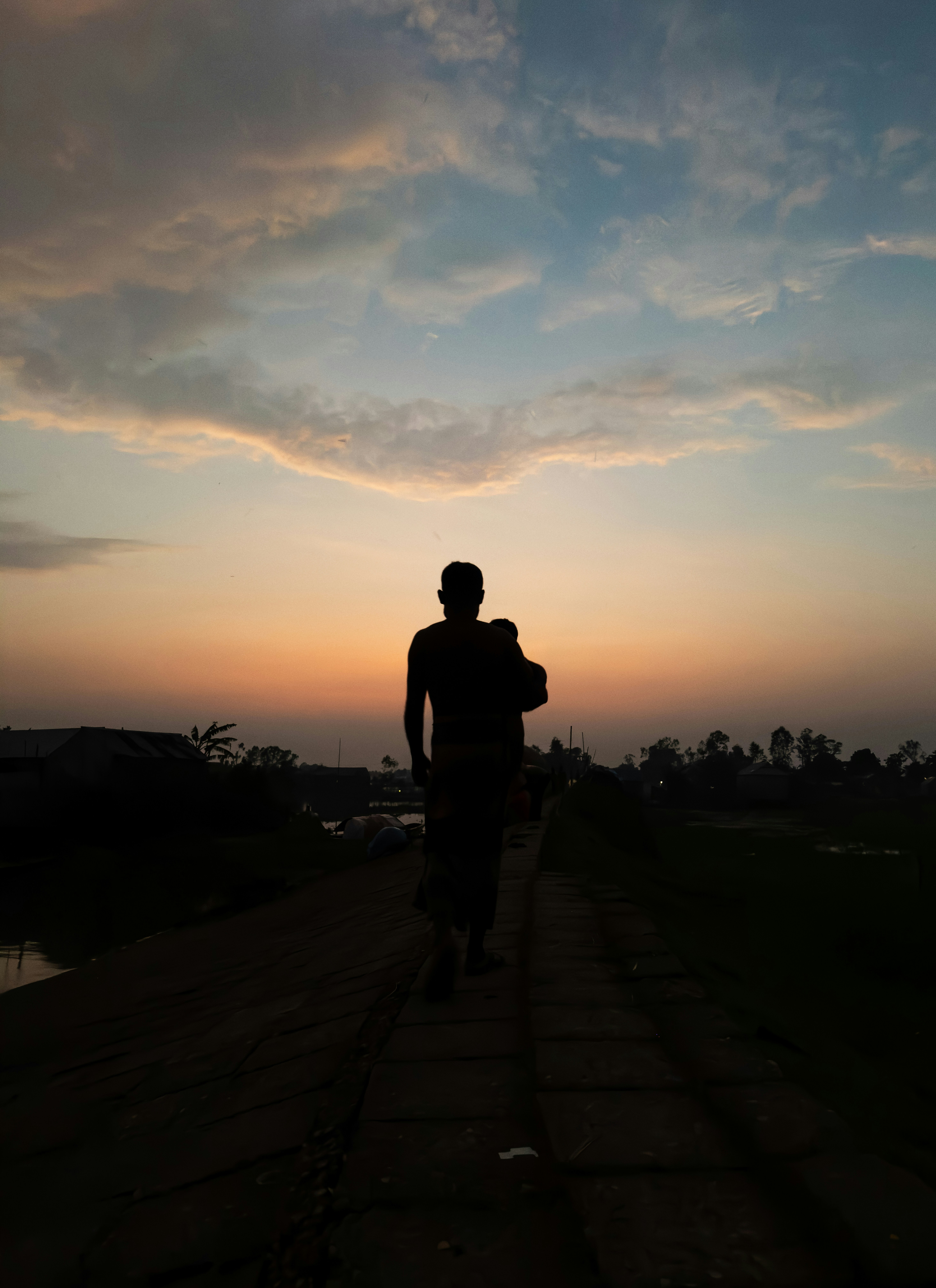A silhouette of a man running at sunset photo – Free Brown Image on ...