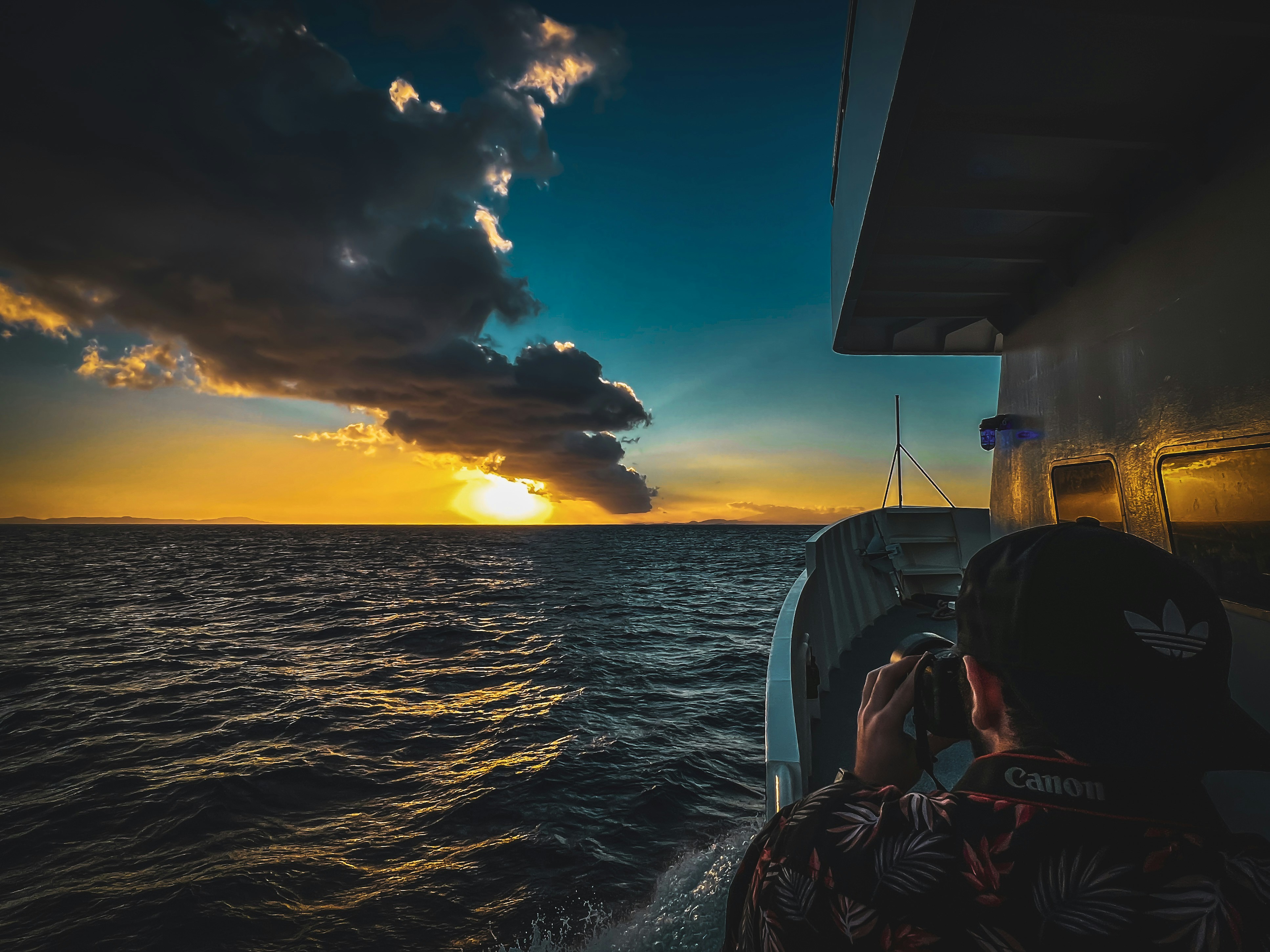 Horizon in Focus: Sunset Aboard the Vessel