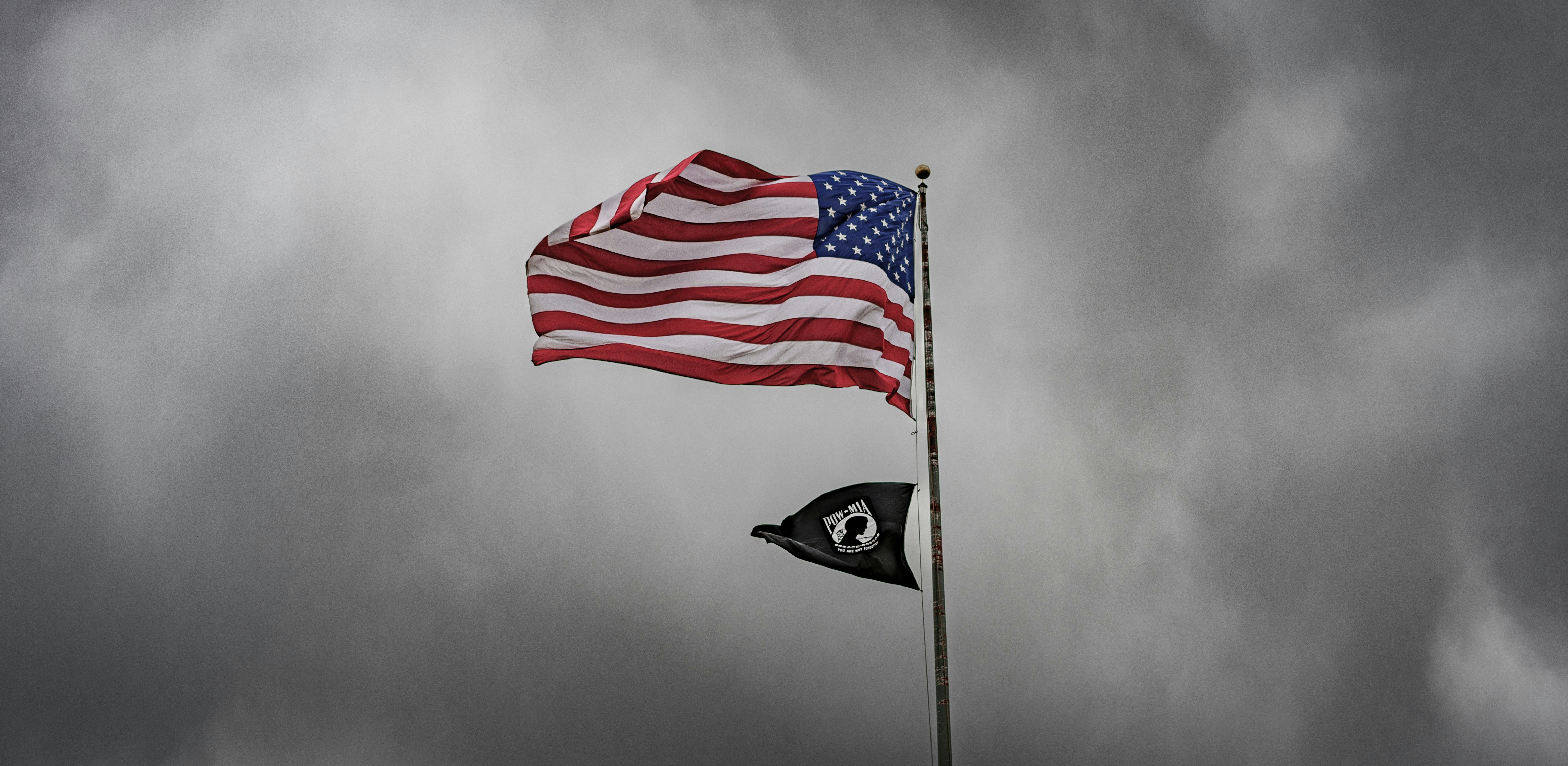 An american flag and an eye on a flag pole photo – Free Flag Image on ...