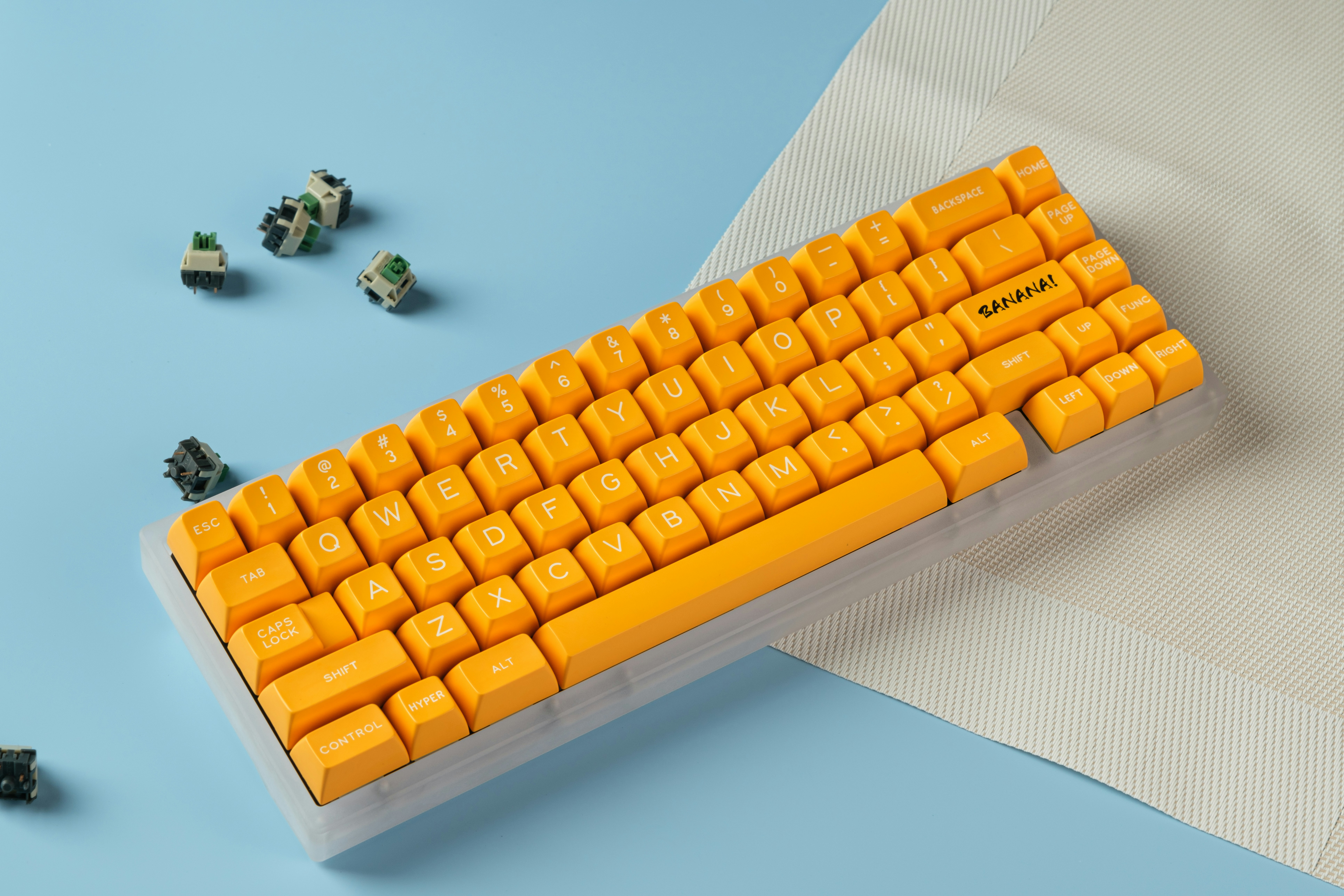 A yellow keyboard sitting on top of a piece of paper photo – Free ...