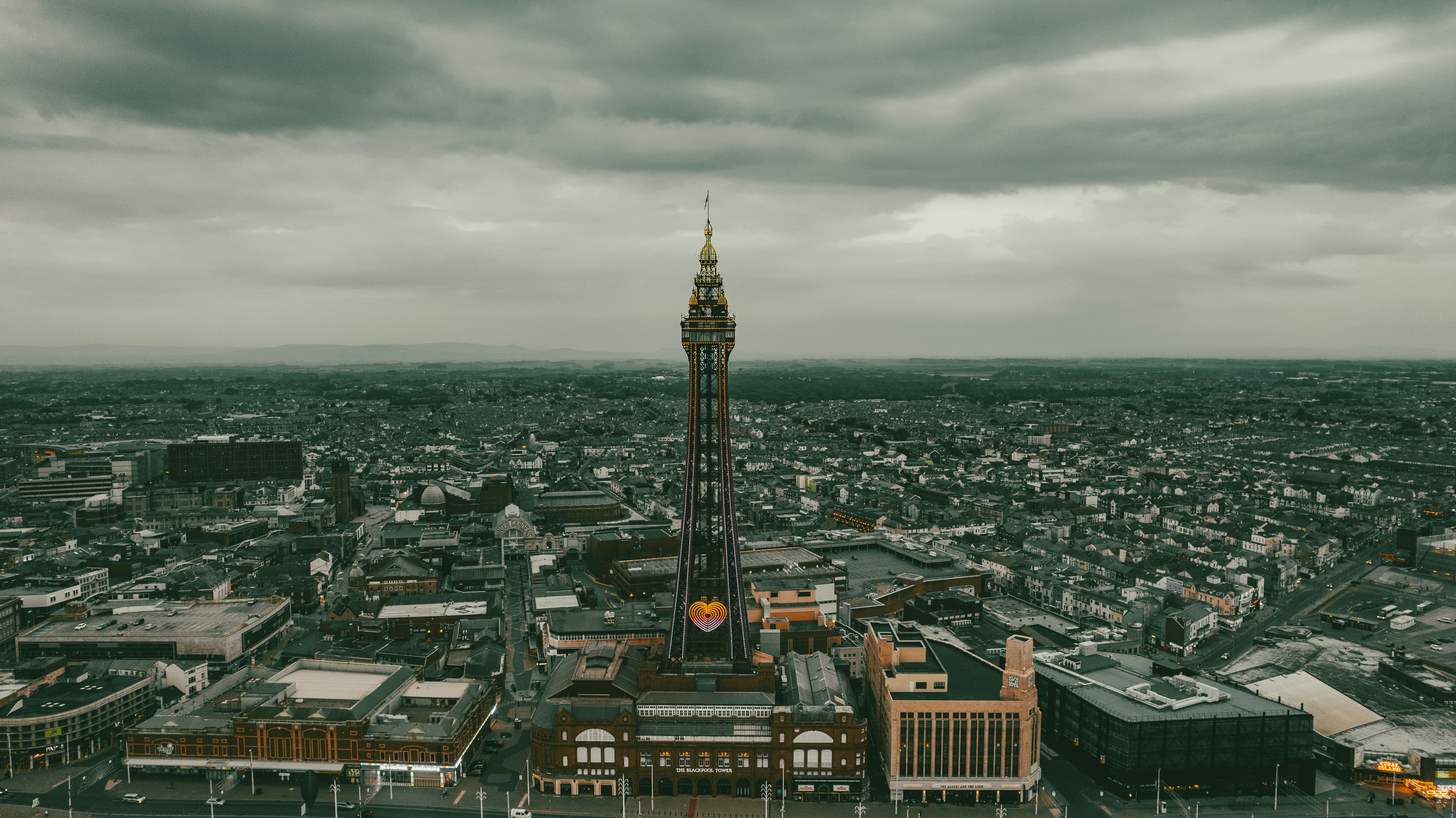 An aerial view of a city with tall buildings photo – Free Blackpool ...