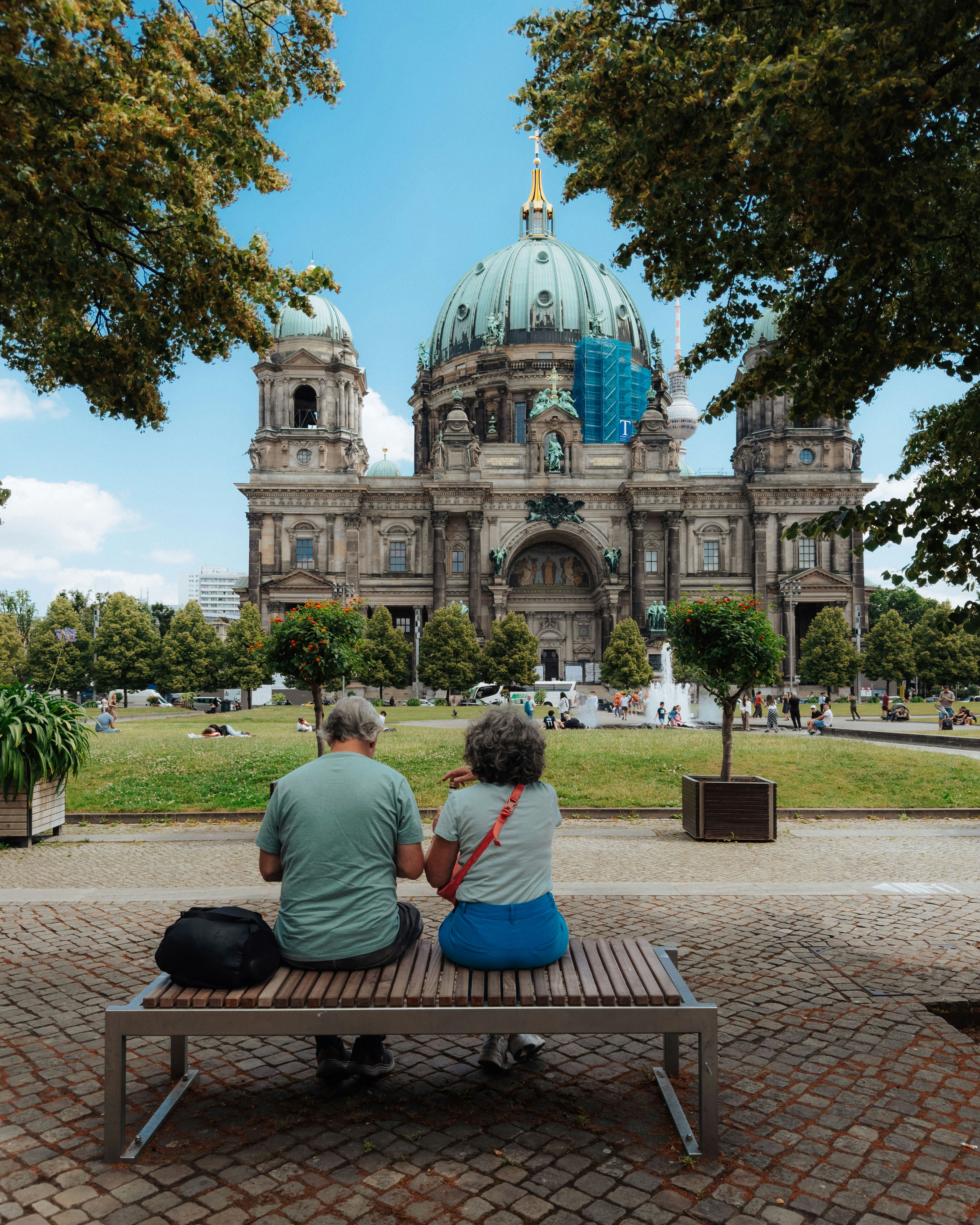 Dome in Focus: A Bench View of Berliner Dom Under a Bright Berlin Sky