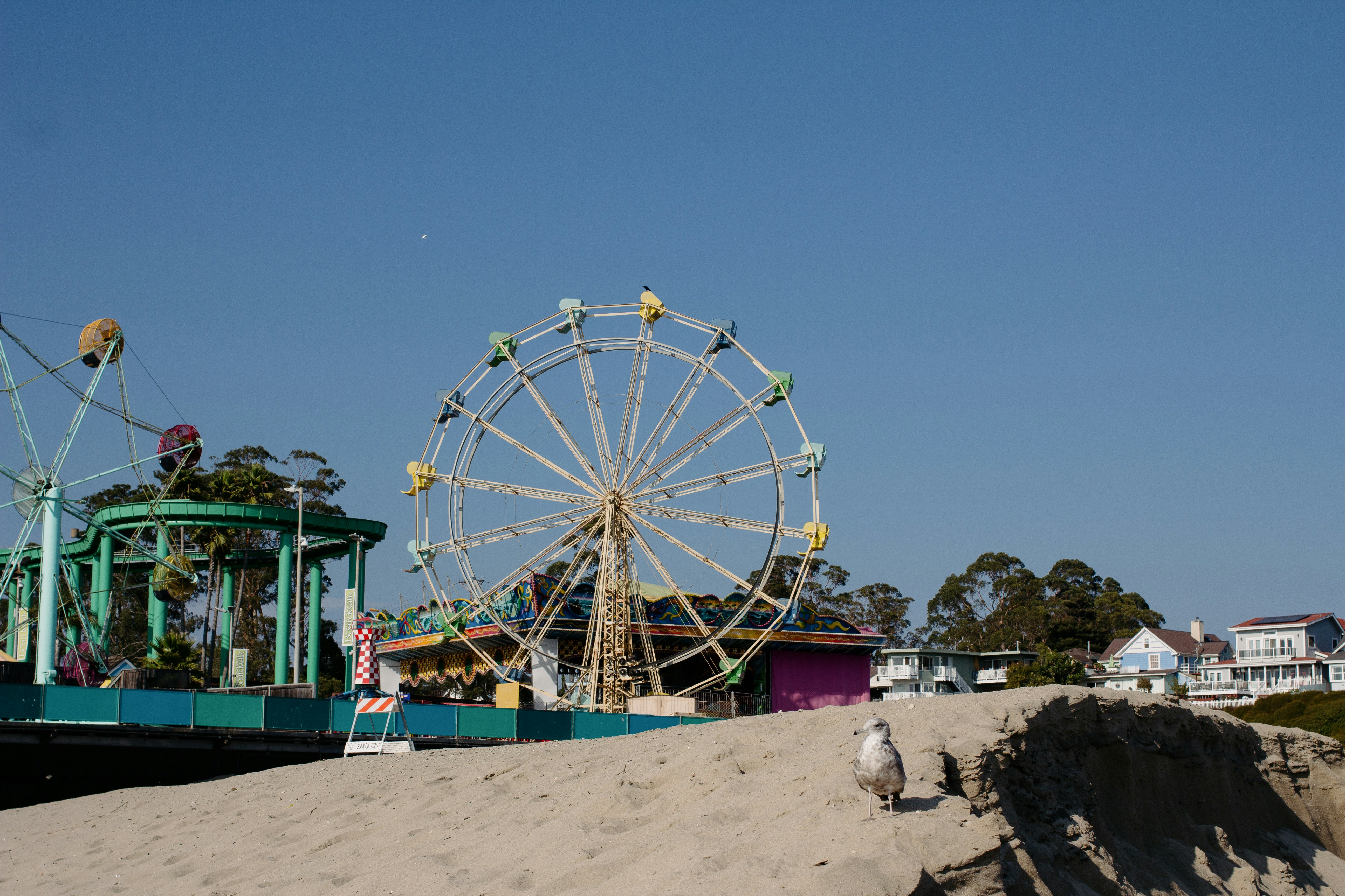 Cerulean Sky Over a Seaside Ferris Wheel