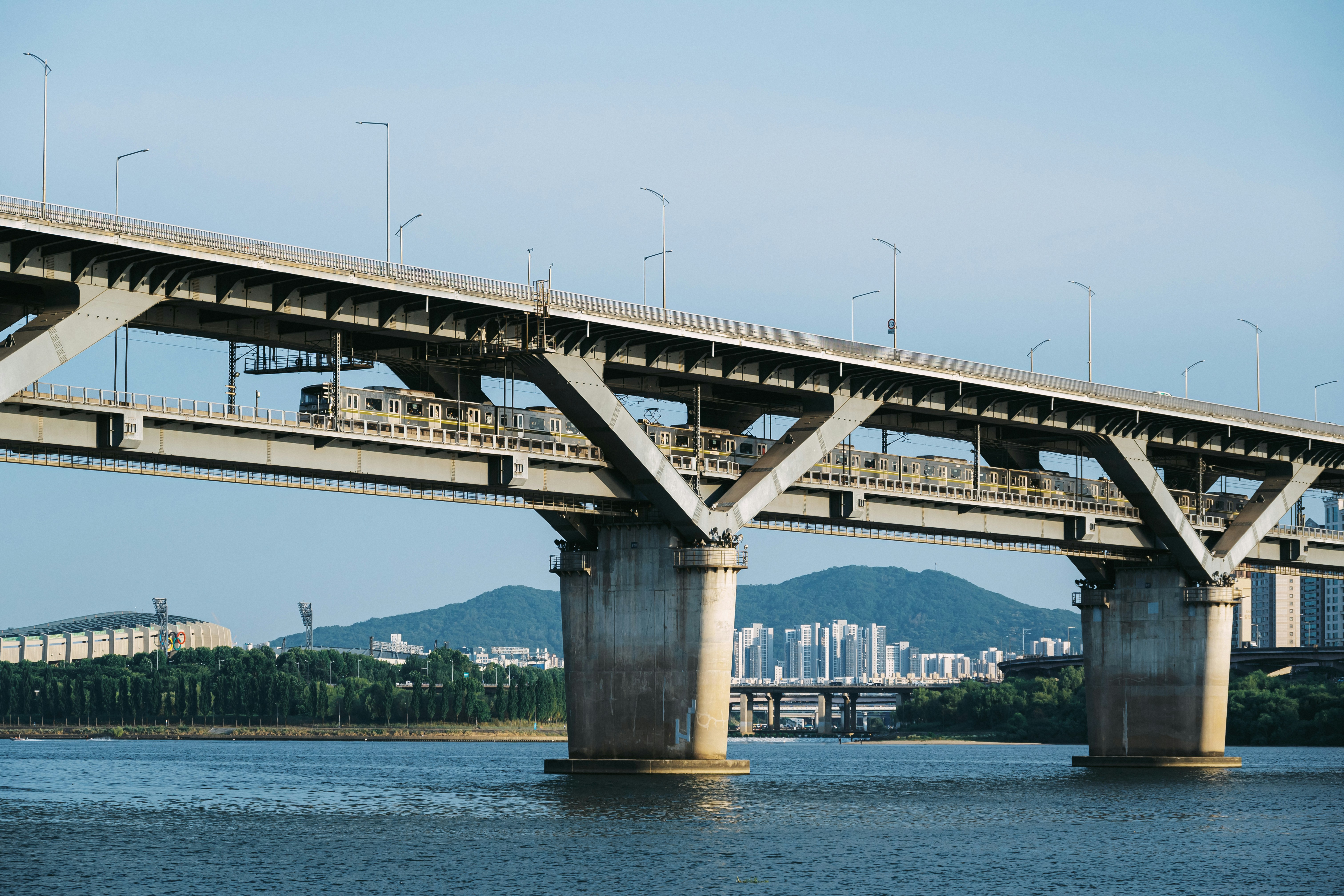 A large bridge over a large body of water photo – Free Travel Image on ...