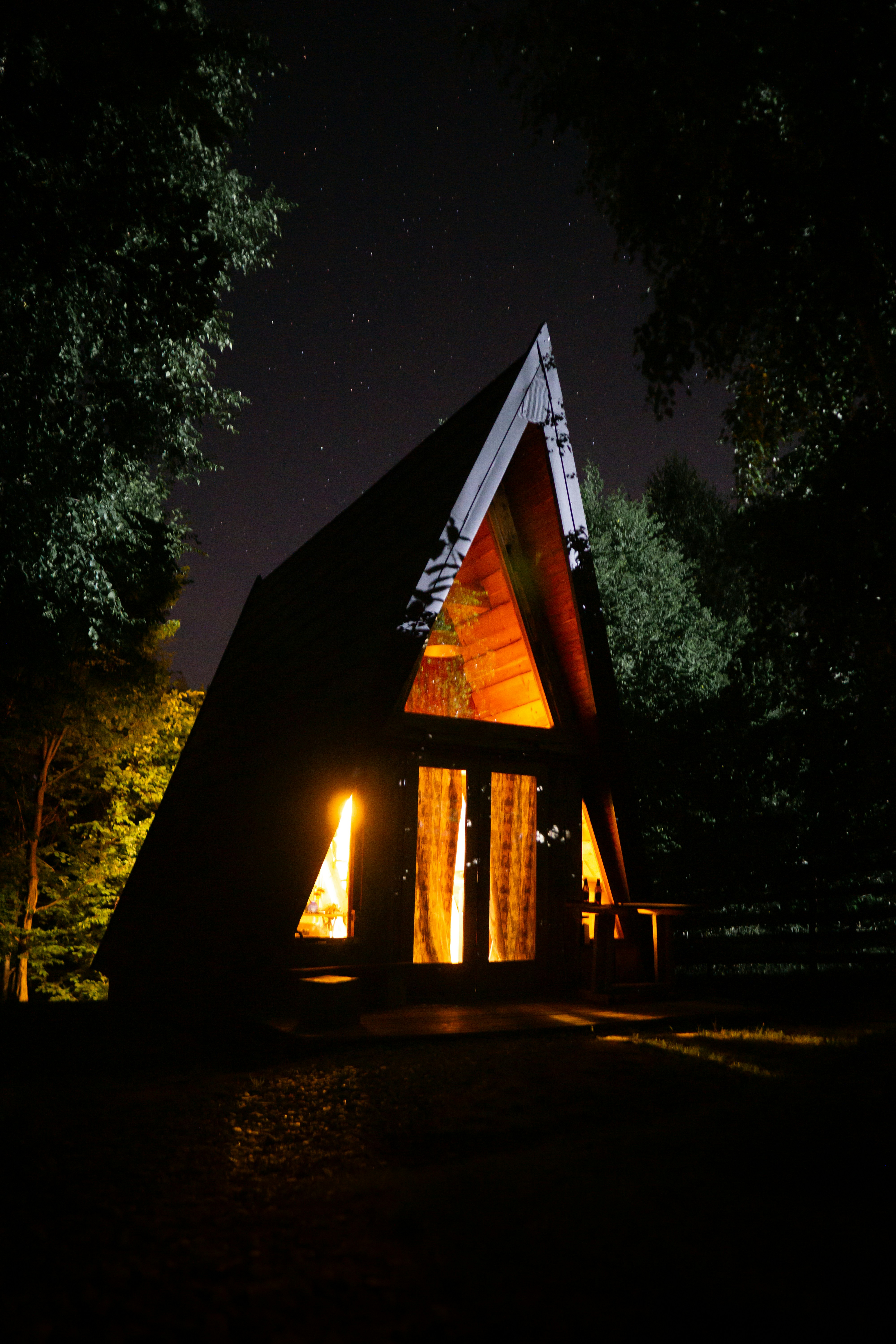 Ember A-Frame under a Starry Forest Night