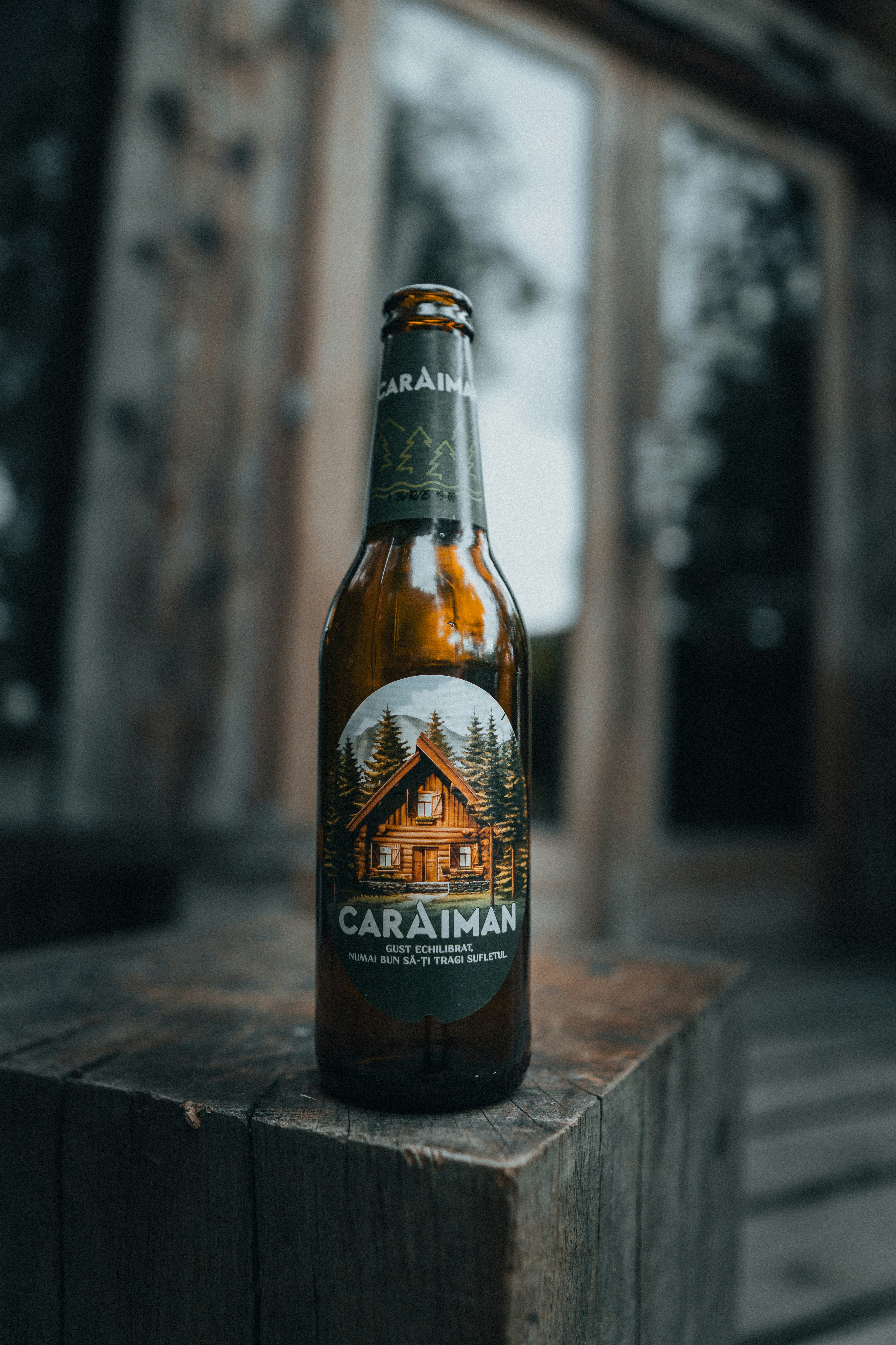 Amber Summit on Weathered Wood: Caraiman Bottle in Clear Focus