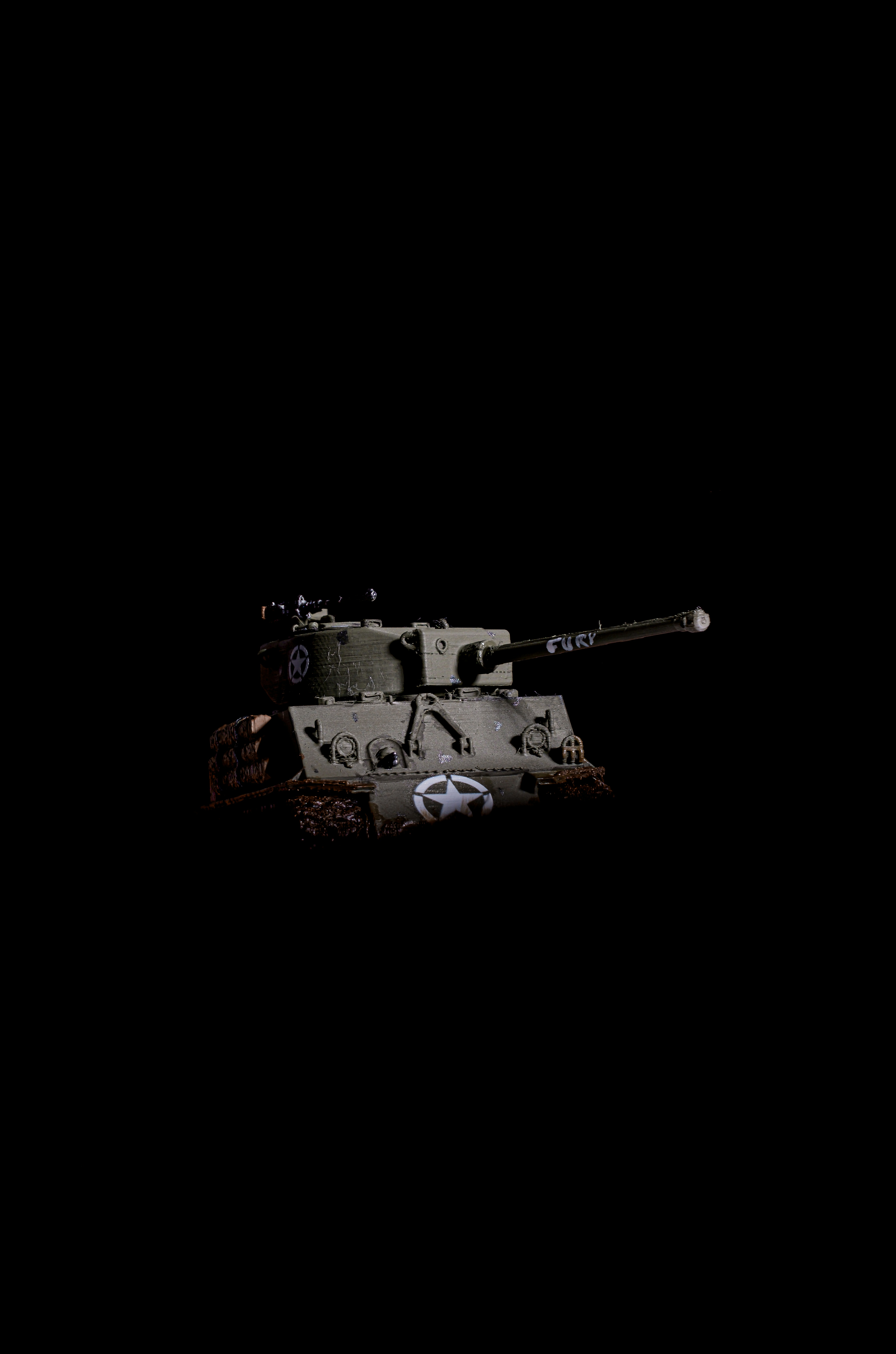 A tank in the dark on a black background