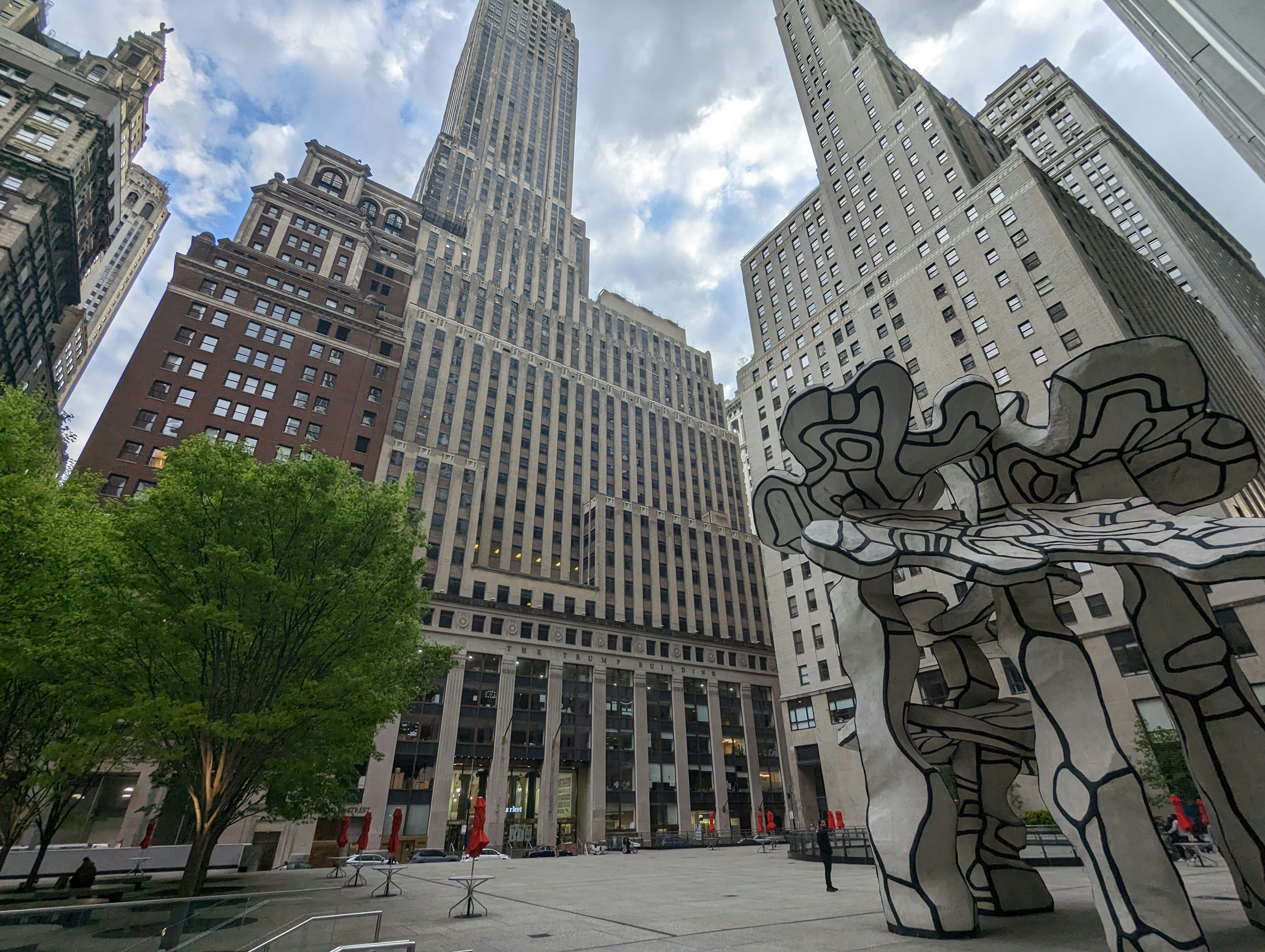 Vertical Giants and a Linear Monument: A City Plaza Between Glass Towers