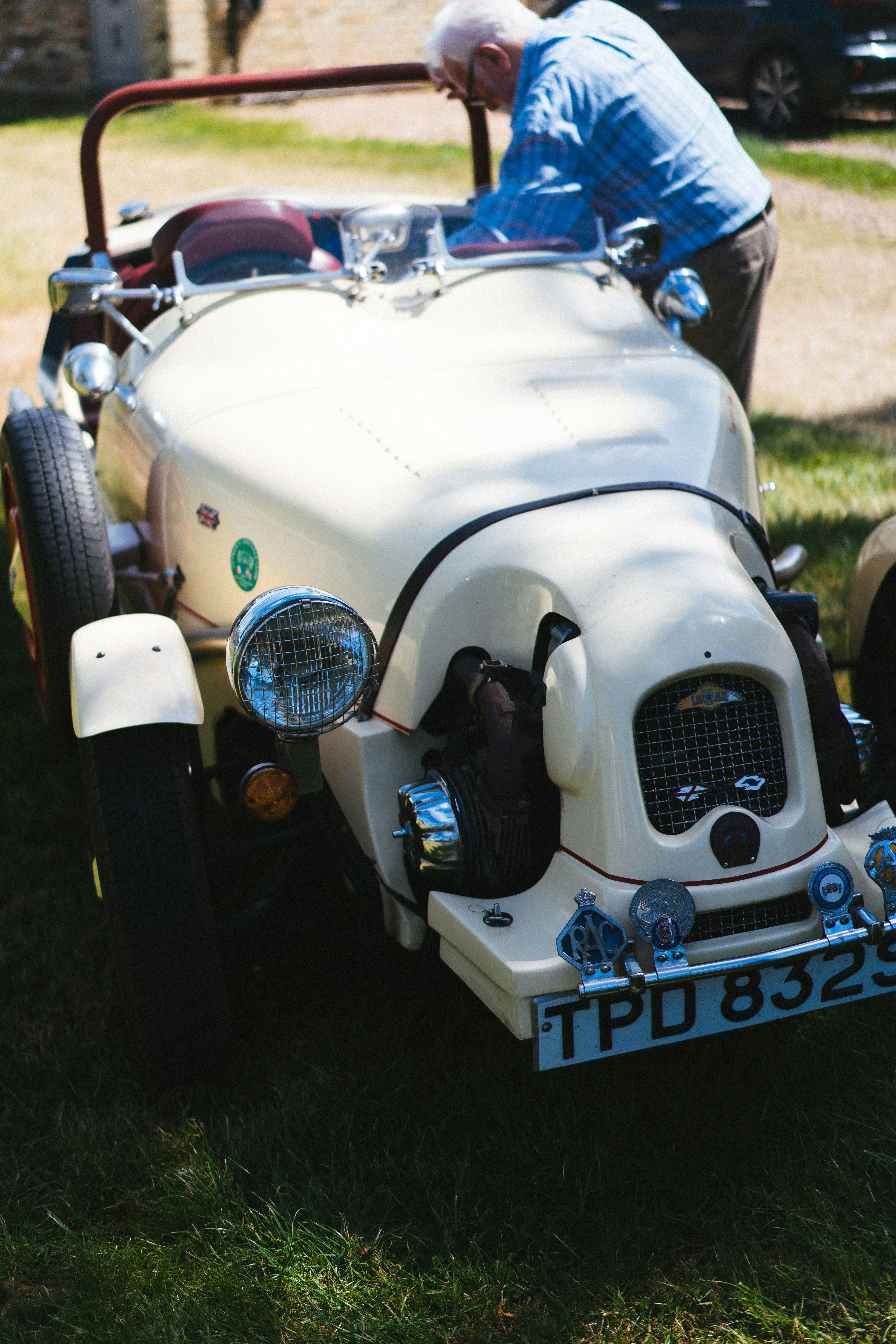 Cream-Colored Vintage Convertible: A Walk-Back to Classic Automotive Charm