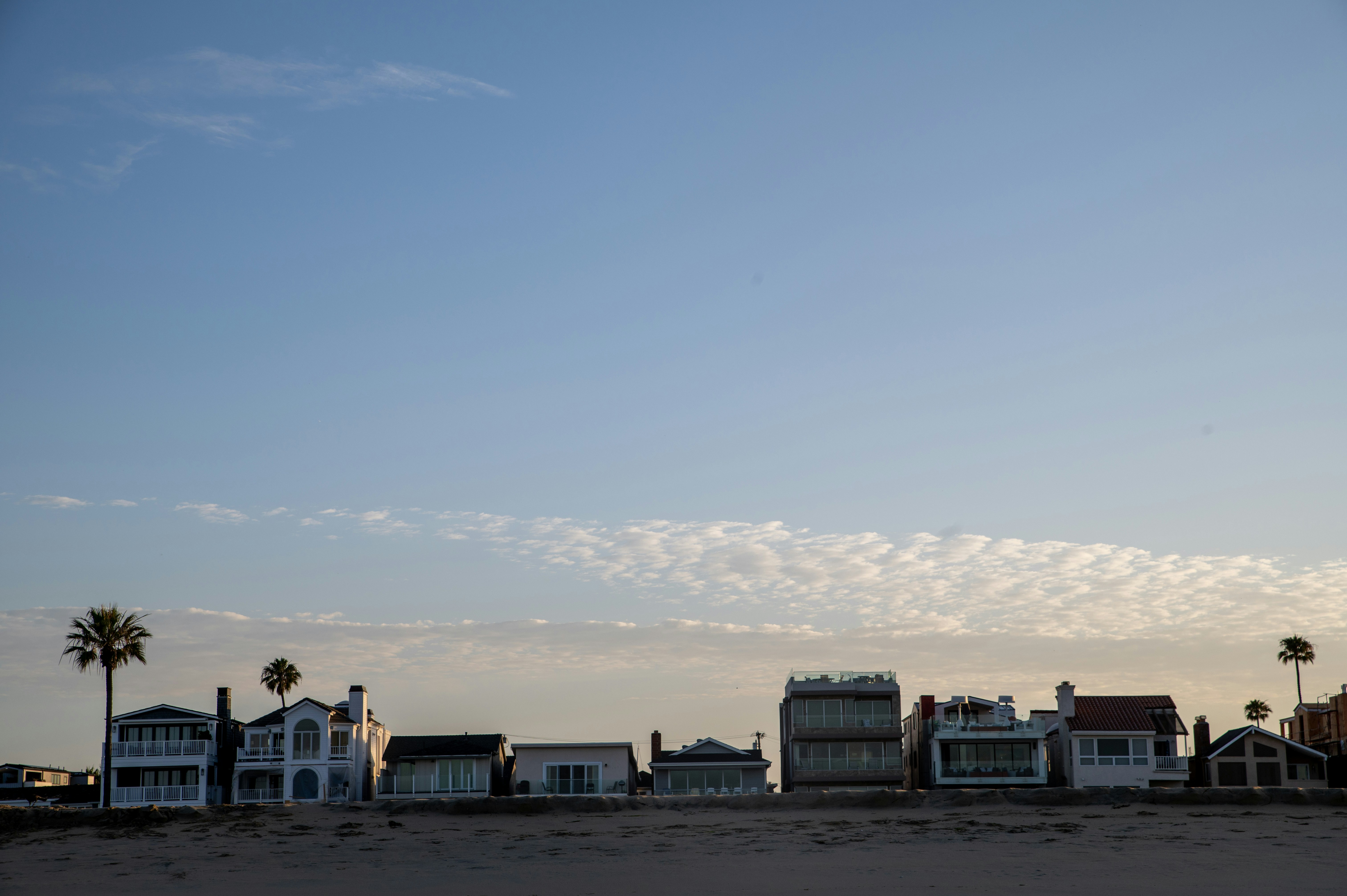 Dune-Line Dwellings Along a Quiet Coastal Row