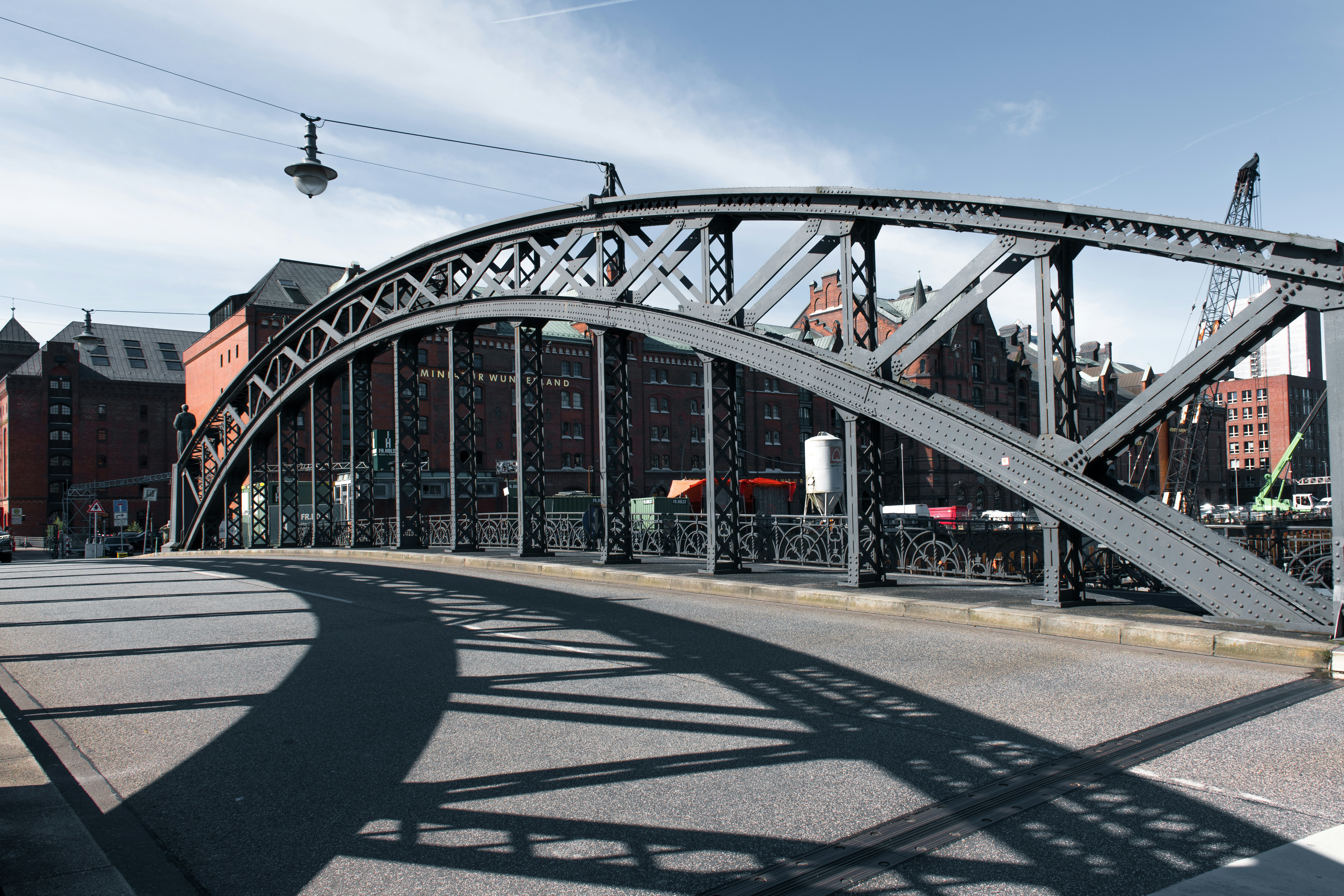 A large metal bridge spanning over a street photo – Free Hamburg Image ...