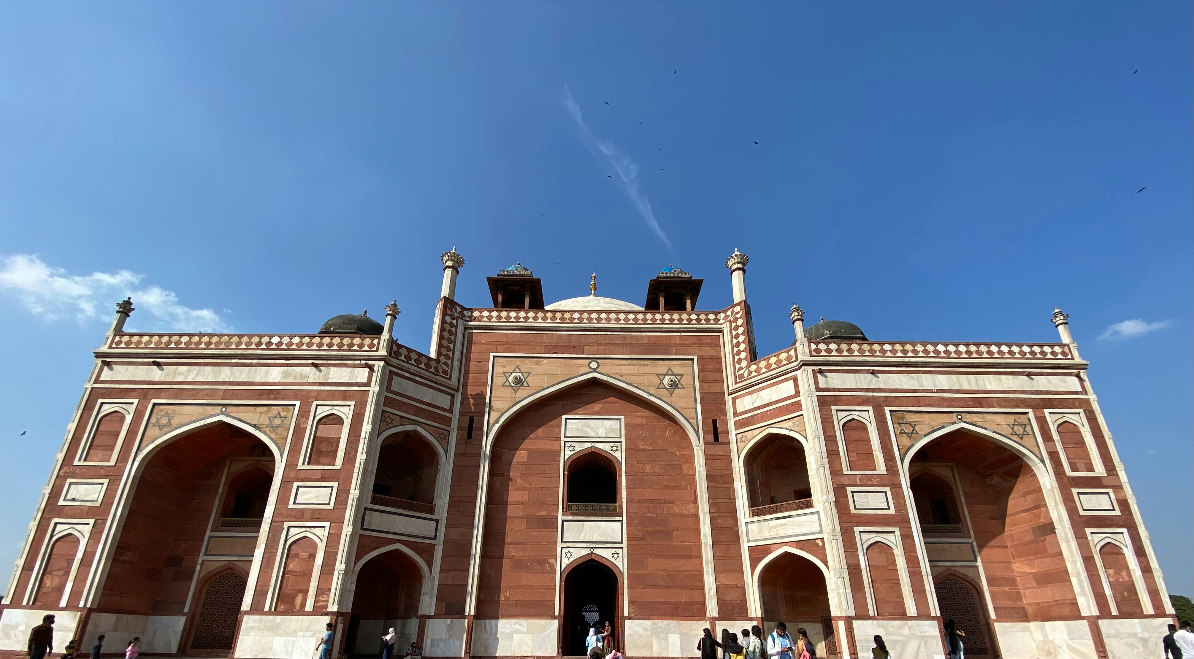 A large brick building with arches and arches