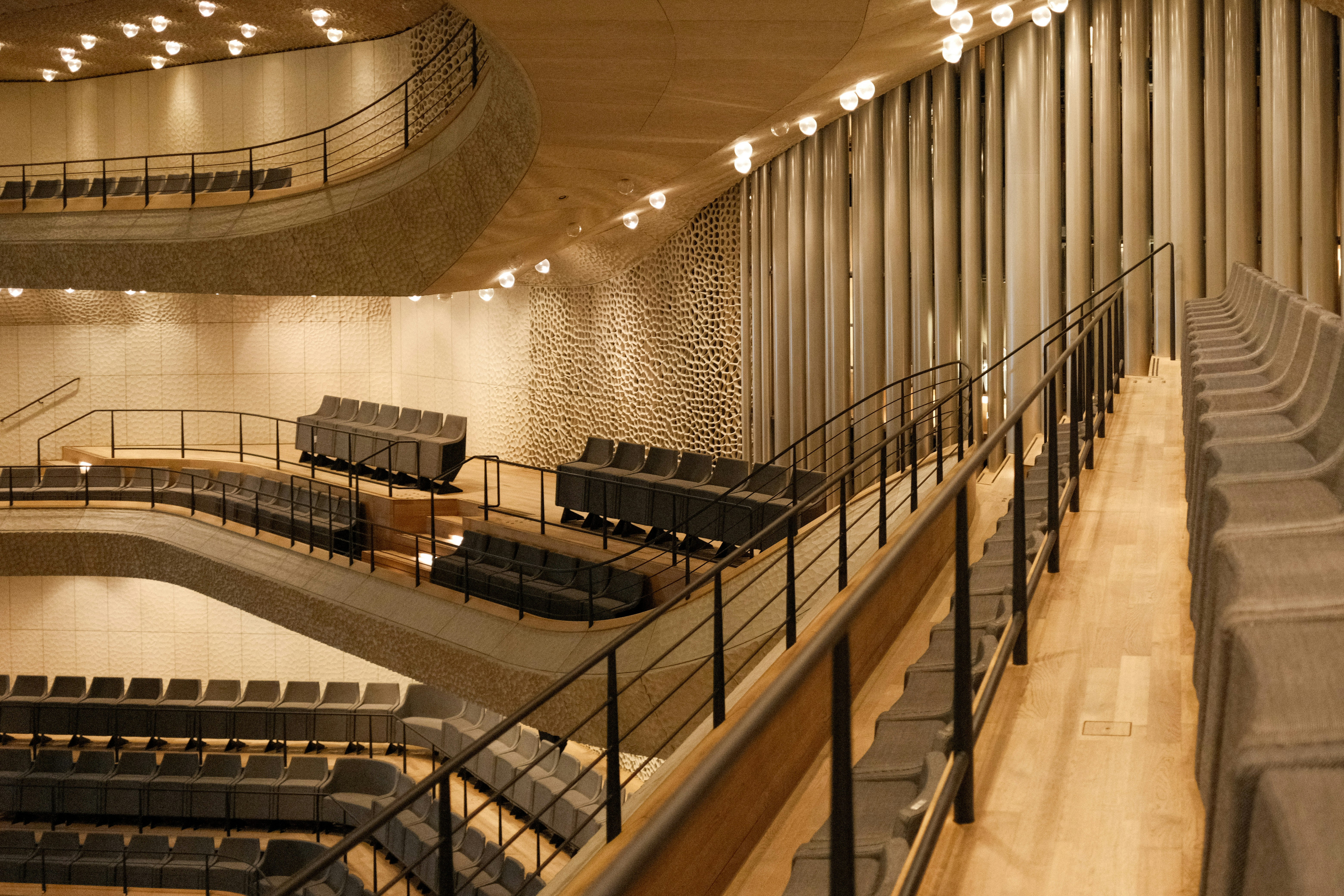 An empty auditorium with rows of empty seats photo – Free ...