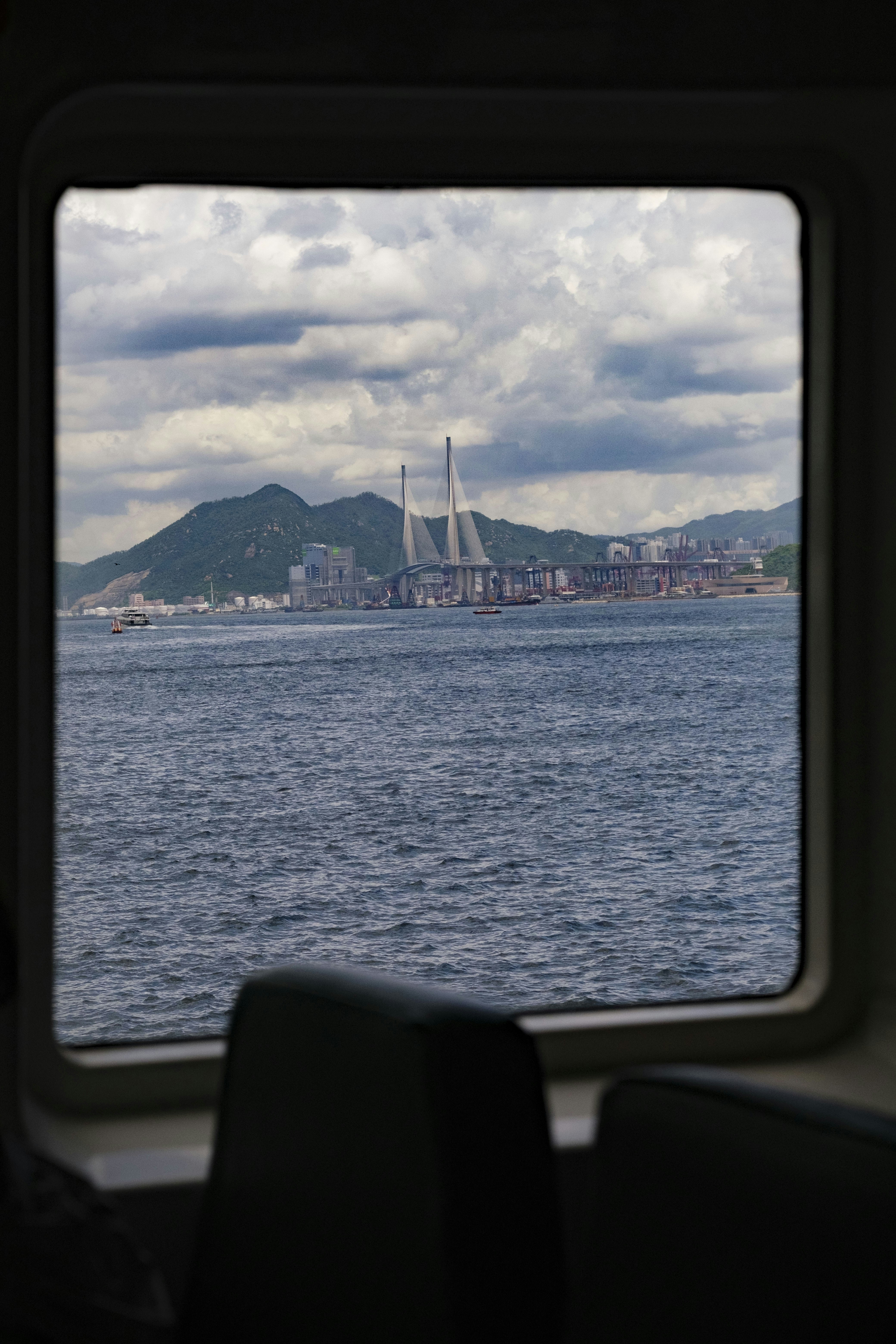 A view of a body of water through a window photo – Free Grey Image on ...