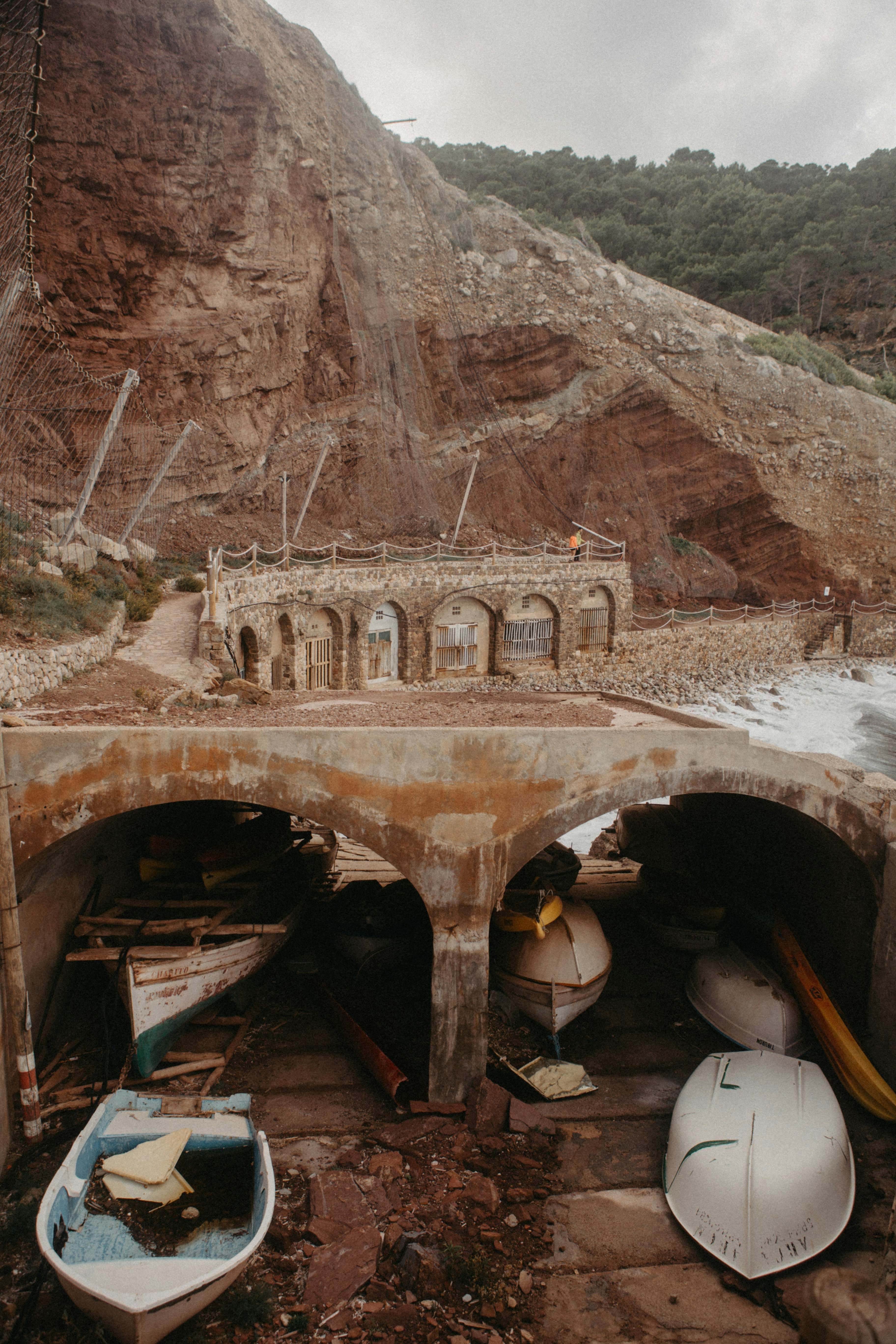 Stone-Arched Boat Shelter Beneath the Cliff