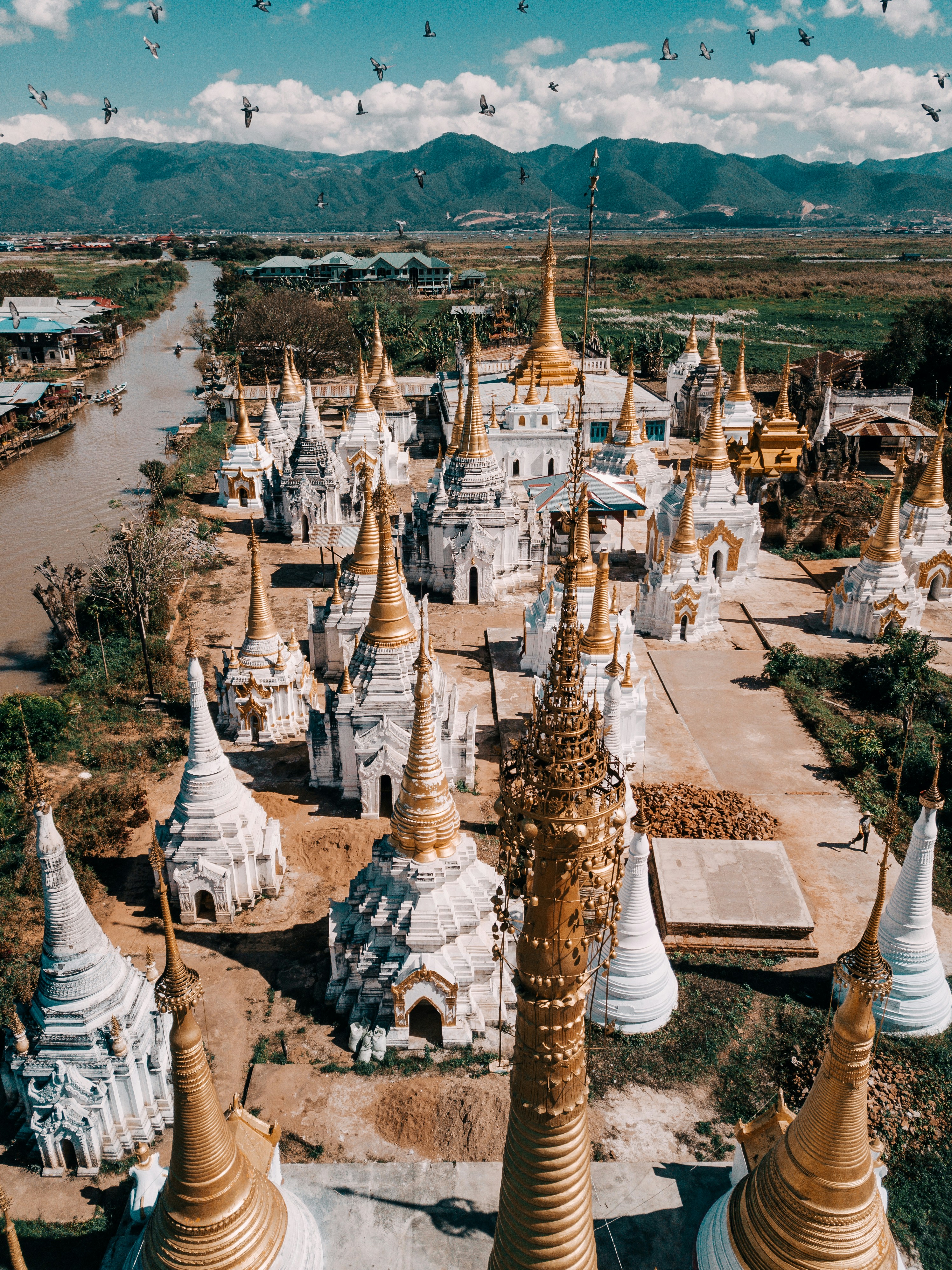 A large group of white and gold buildings photo – Free Inle lake Image ...
