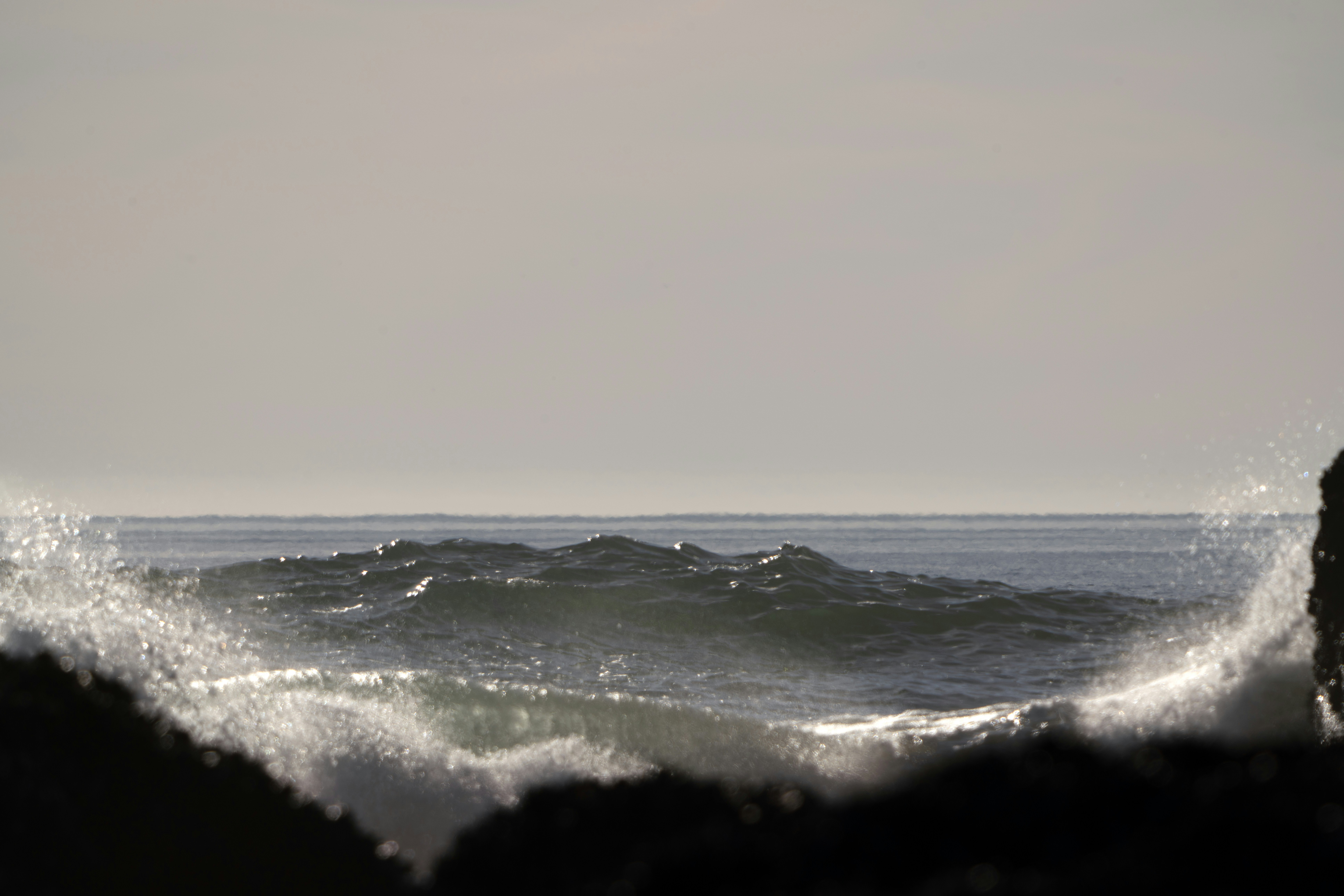 Cresting Light Over a Quiet Shoreline