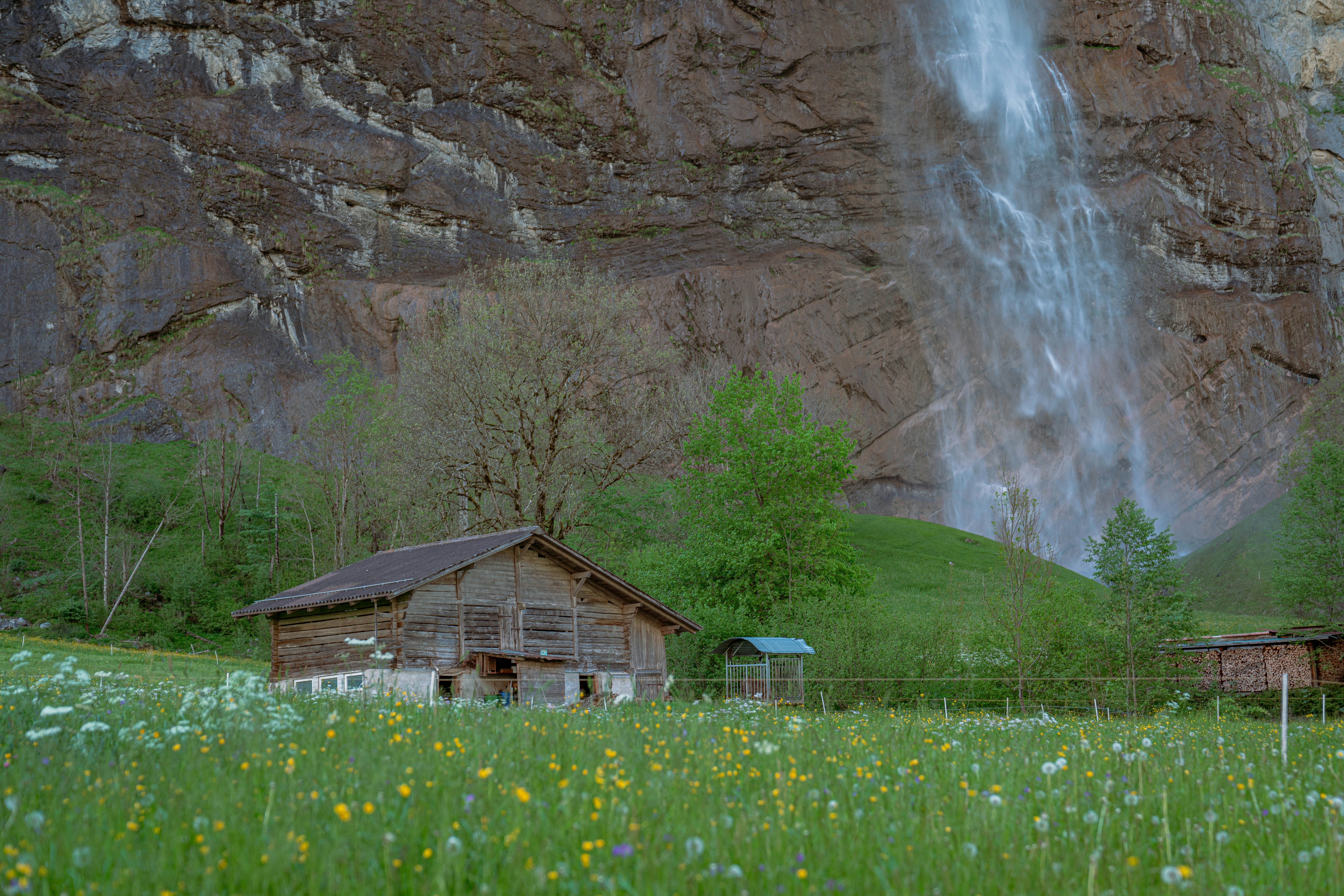 Farmstead Beneath a Cascading Curtain