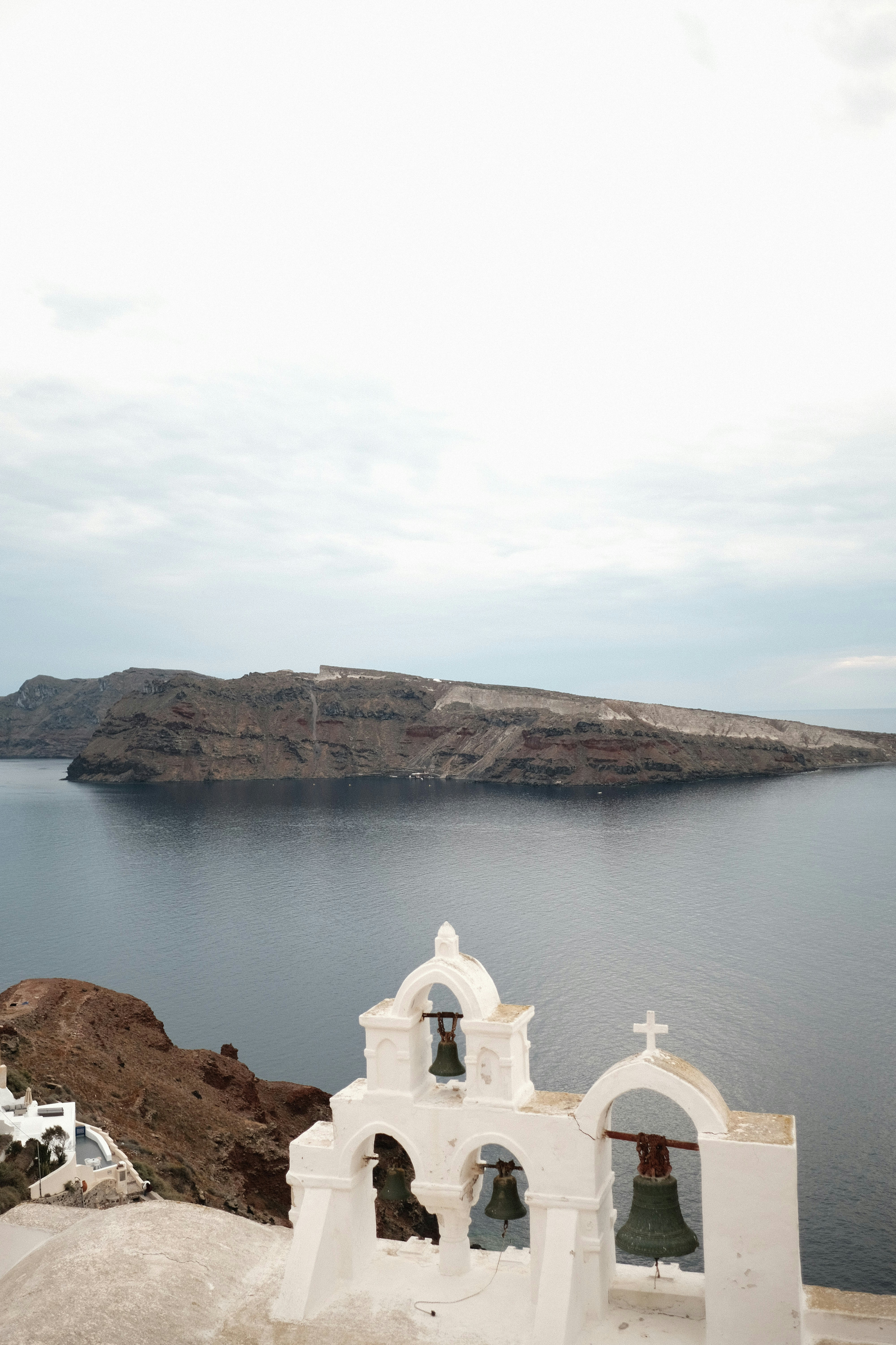 White Bells Over Aegean Horizon