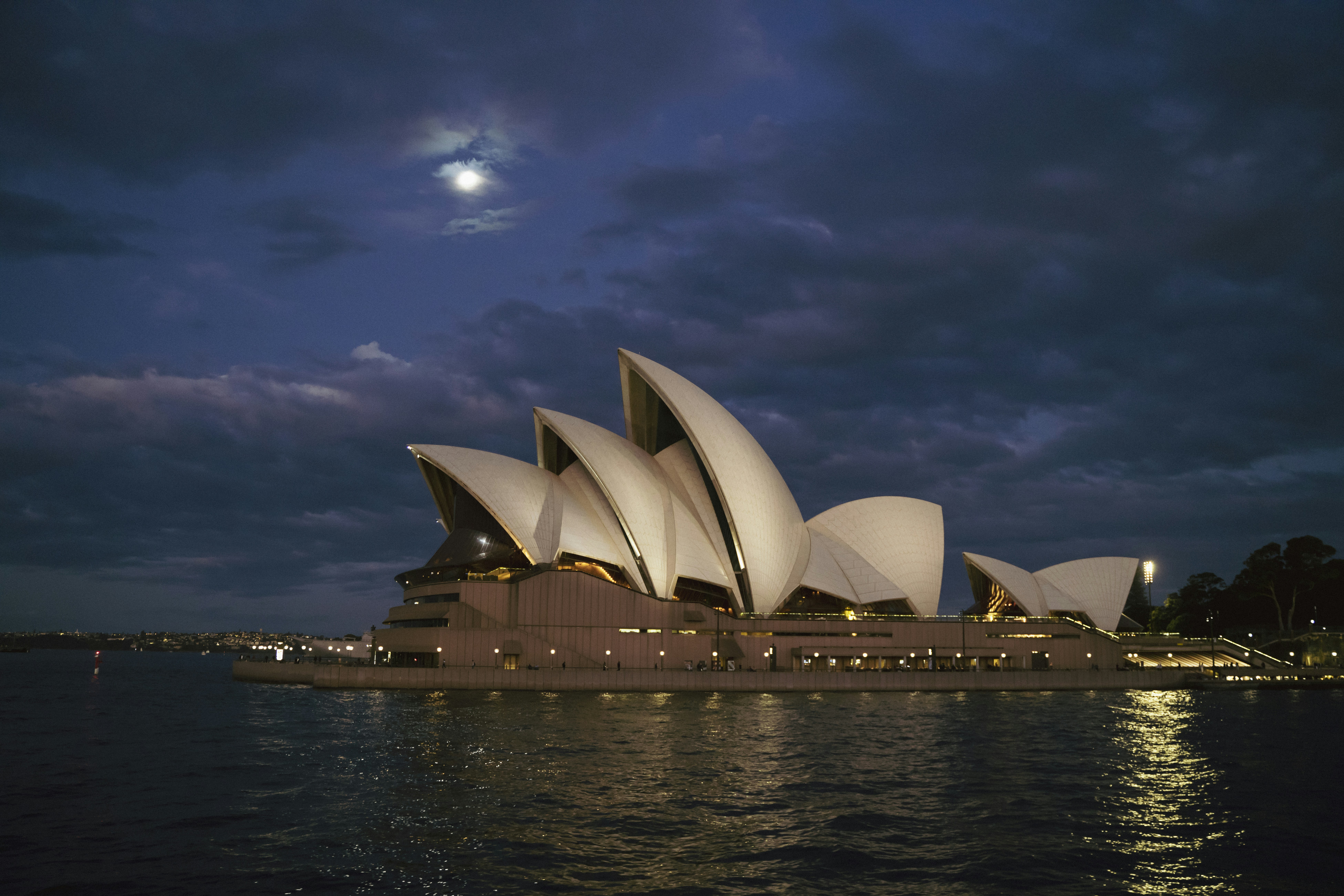 The sydney opera house is lit up at night photo – Free Sydney opera ...