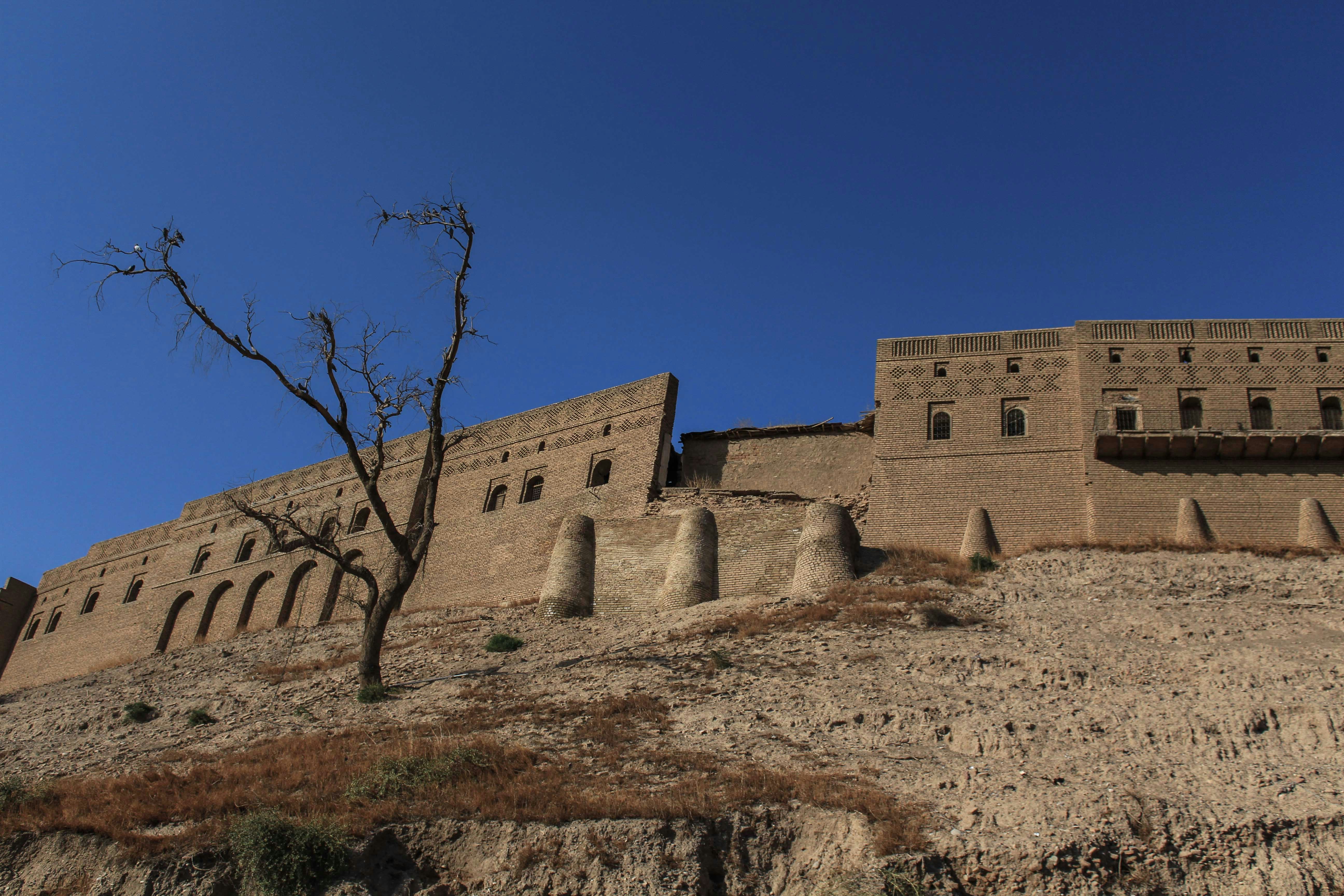 A large stone building on top of a hill photo – Free Erbil Image on ...