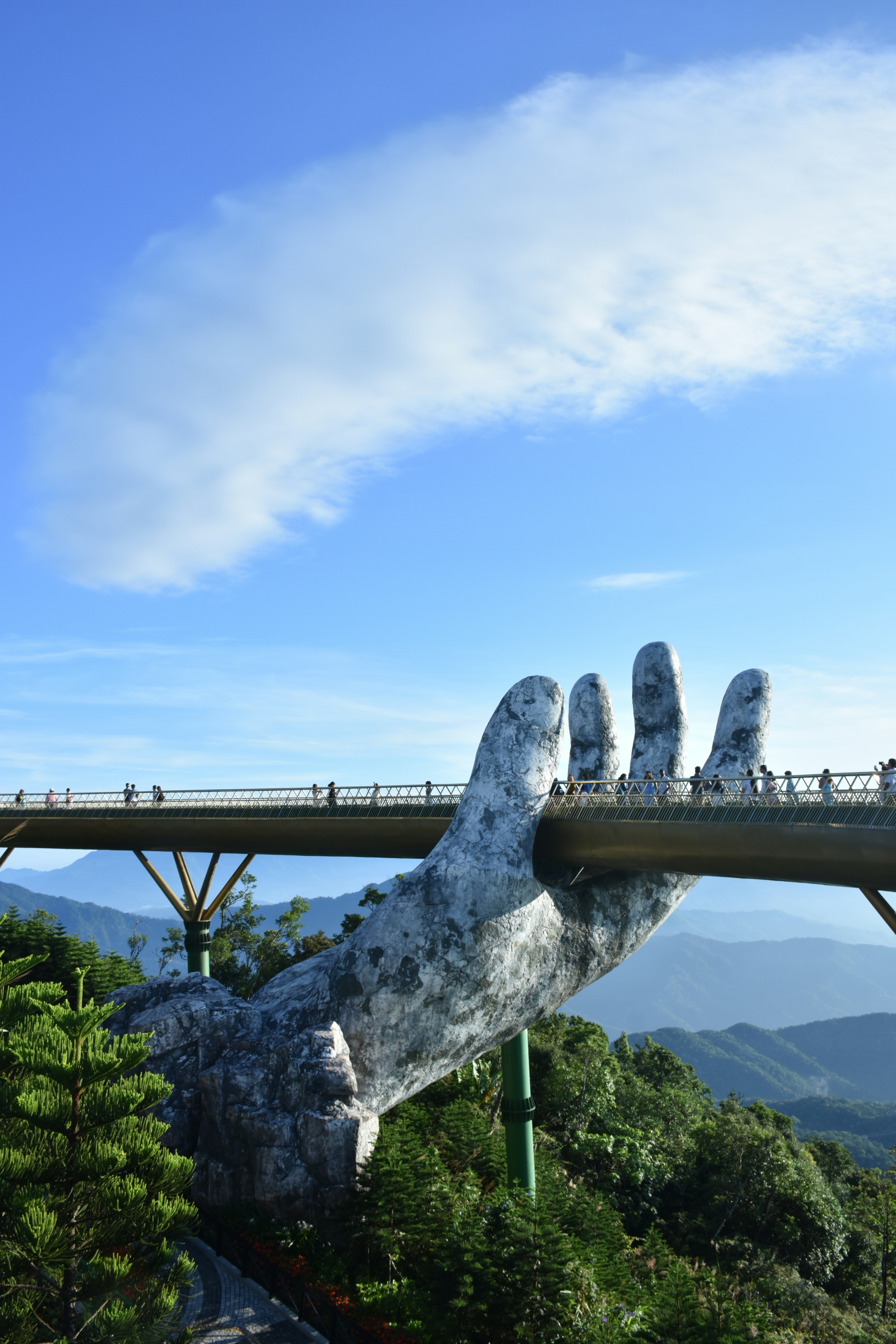 A giant hand that is on top of a bridge photo – Free Ba na hills Image ...