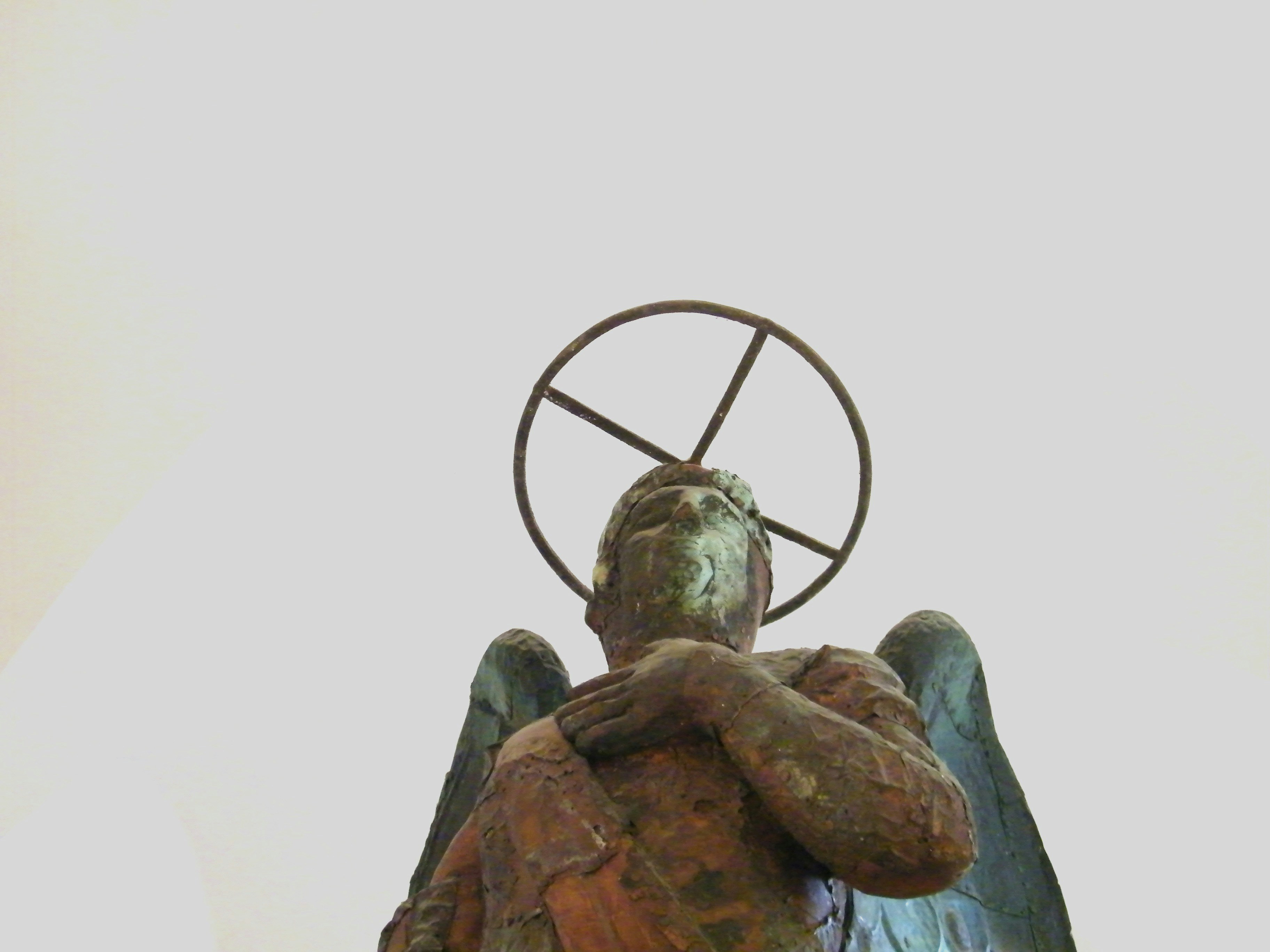 A statue of an angel holding a wheel of life photo – Free Venezia Image ...