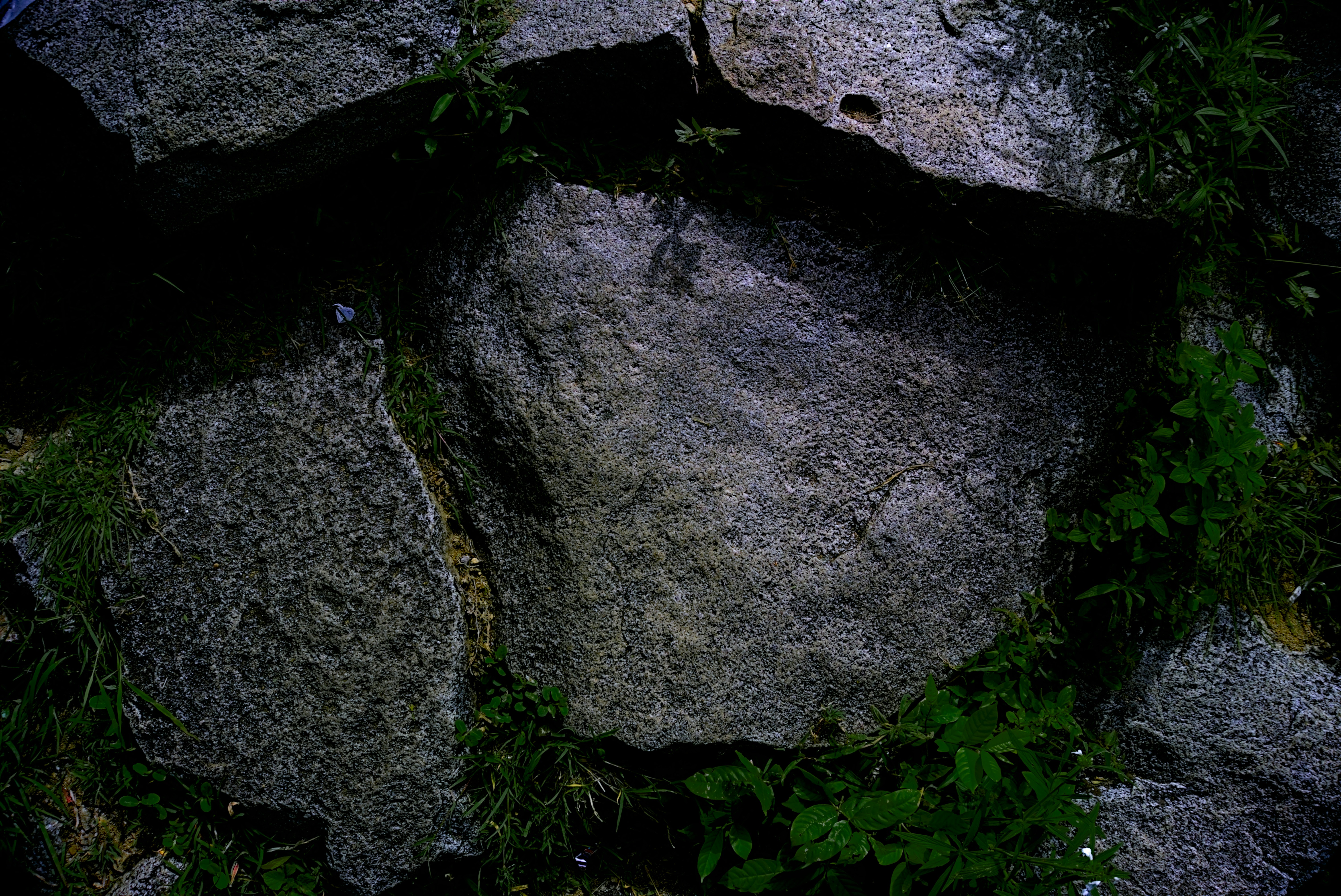 A teddy bear sitting on top of a pile of rocks photo – Free Stones ...