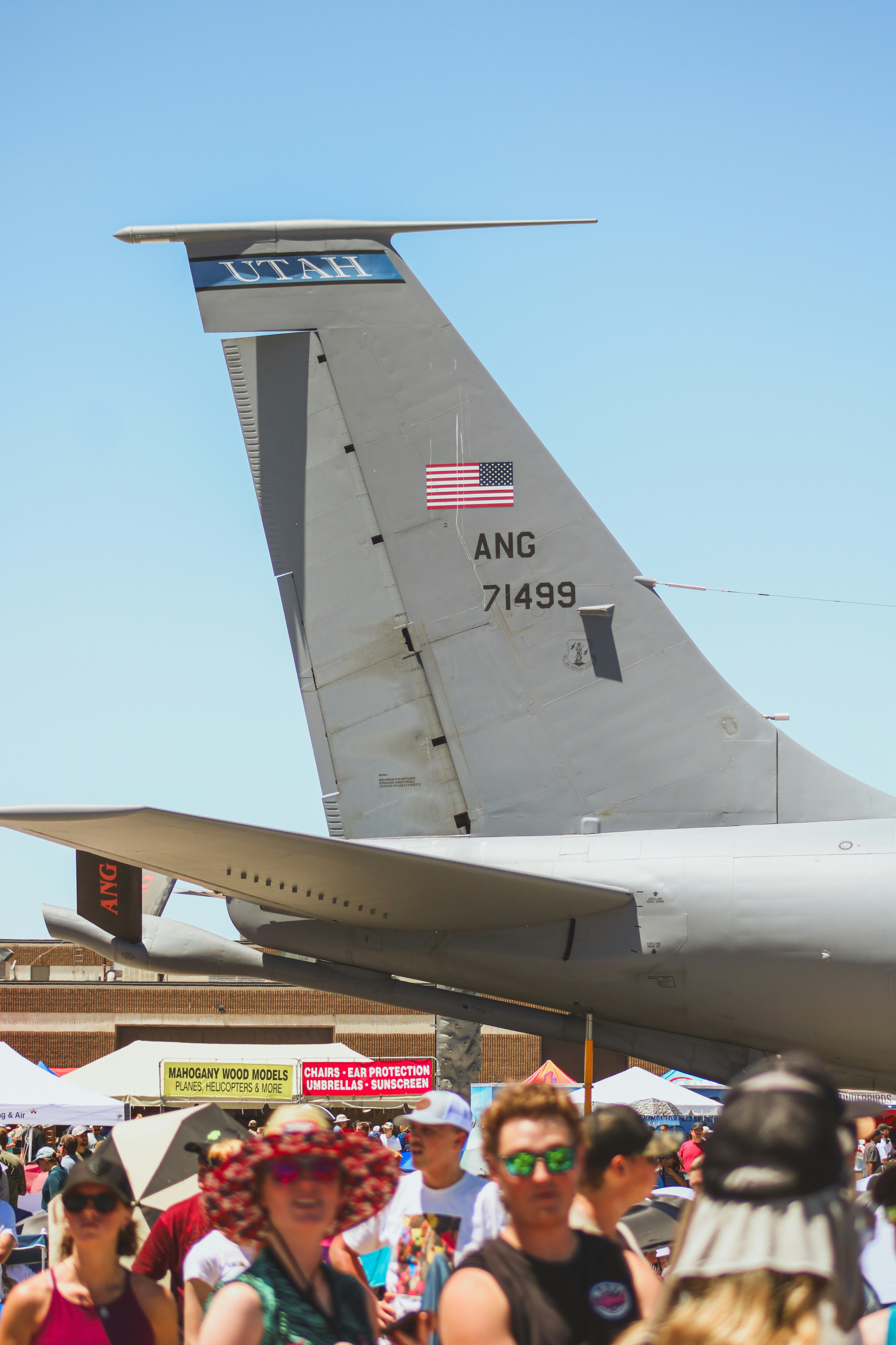 Sunlit Utah ANG Tail Fin Rises Over a Crowded Airshow