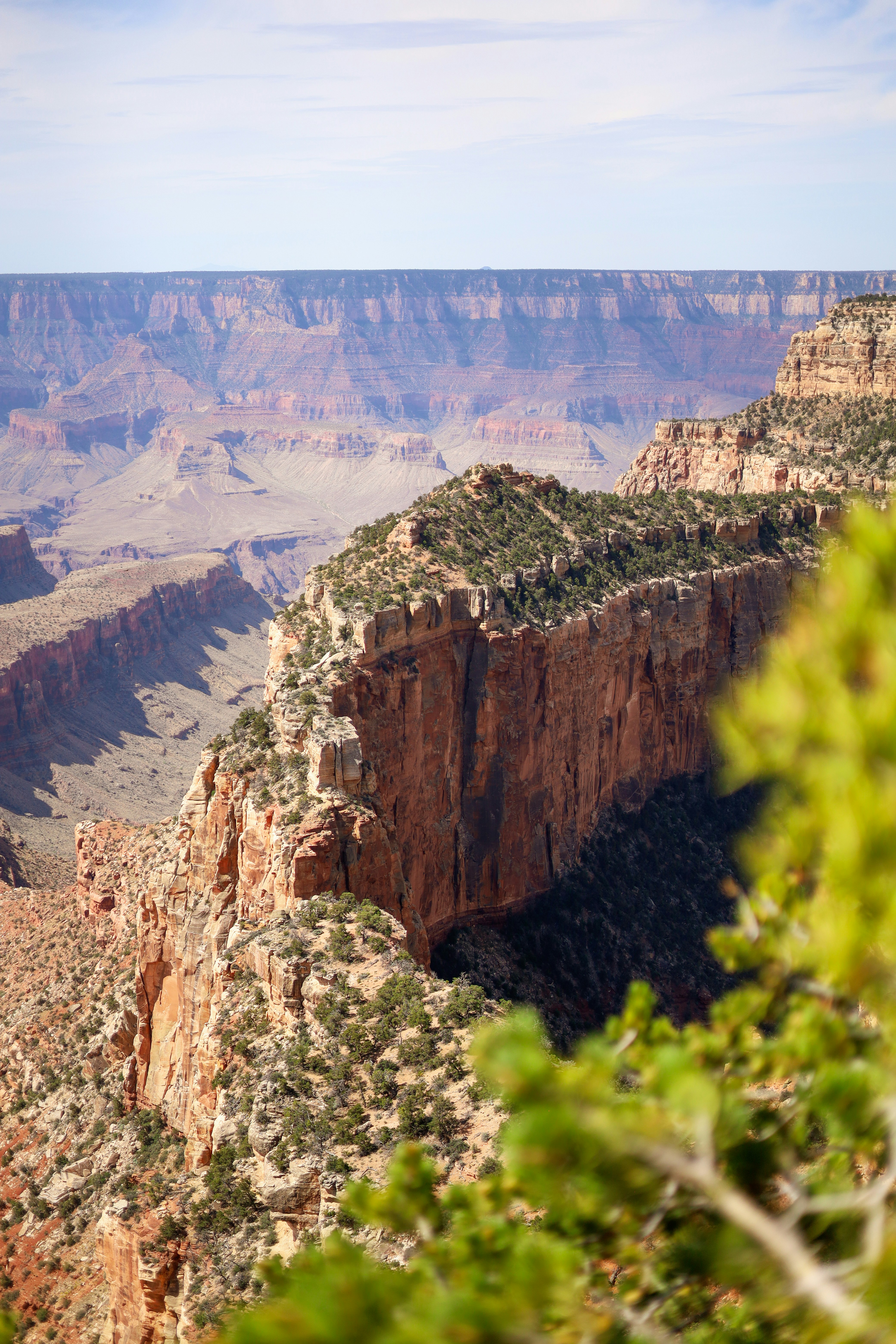 A view of the grand canyon from the rim of a cliff photo – Free Grand ...