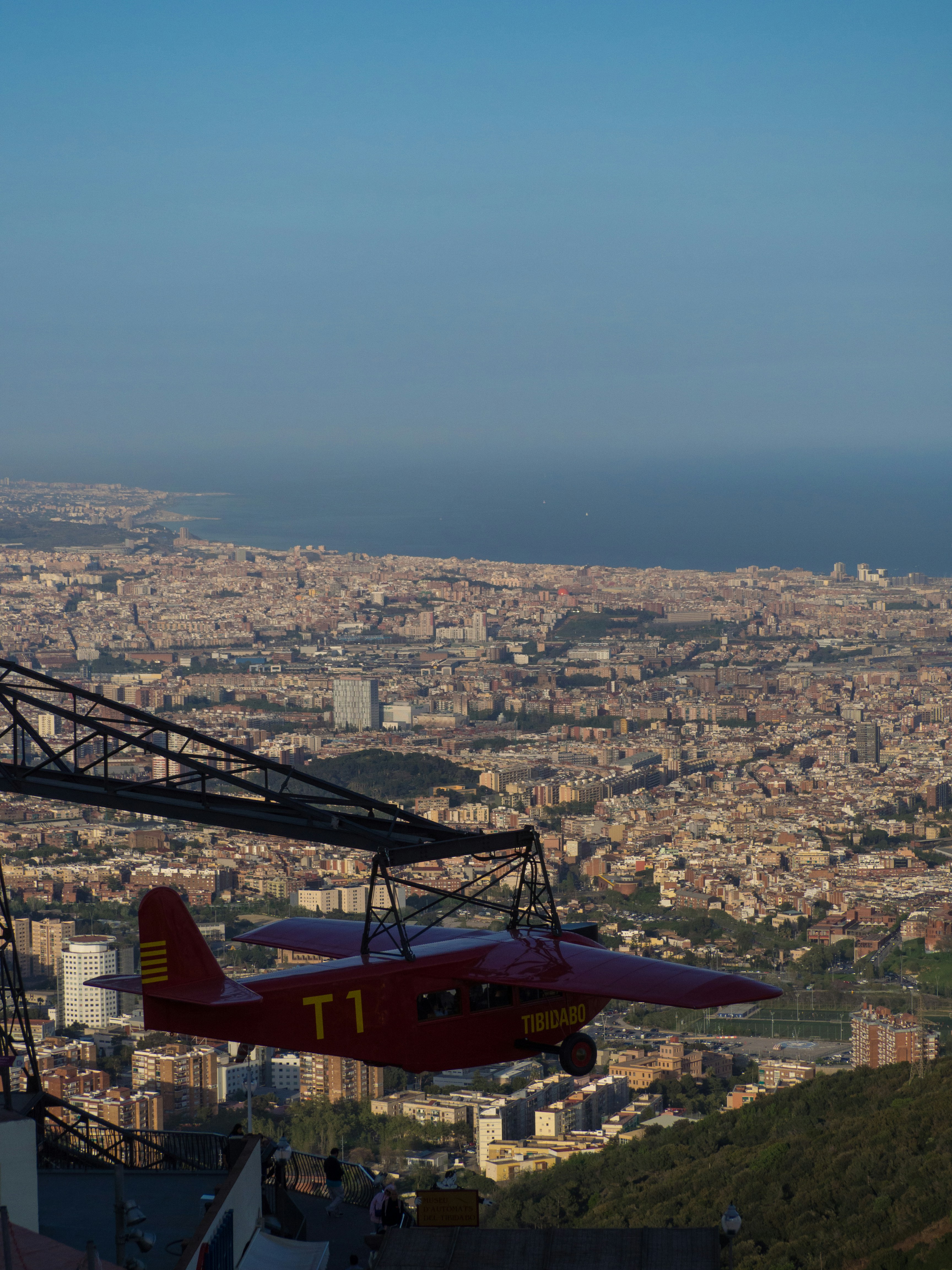 Red Legend in the Sky: T-1 Training Over Barcelona