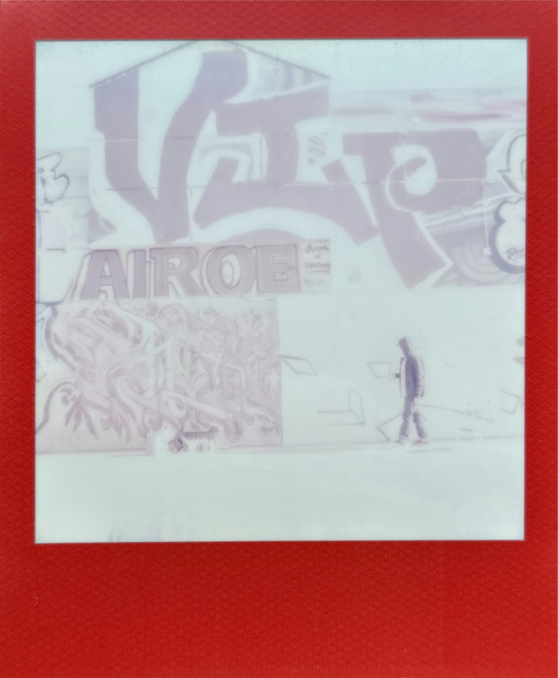 A red frame with a picture of a man walking photo – Free Los angeles ...