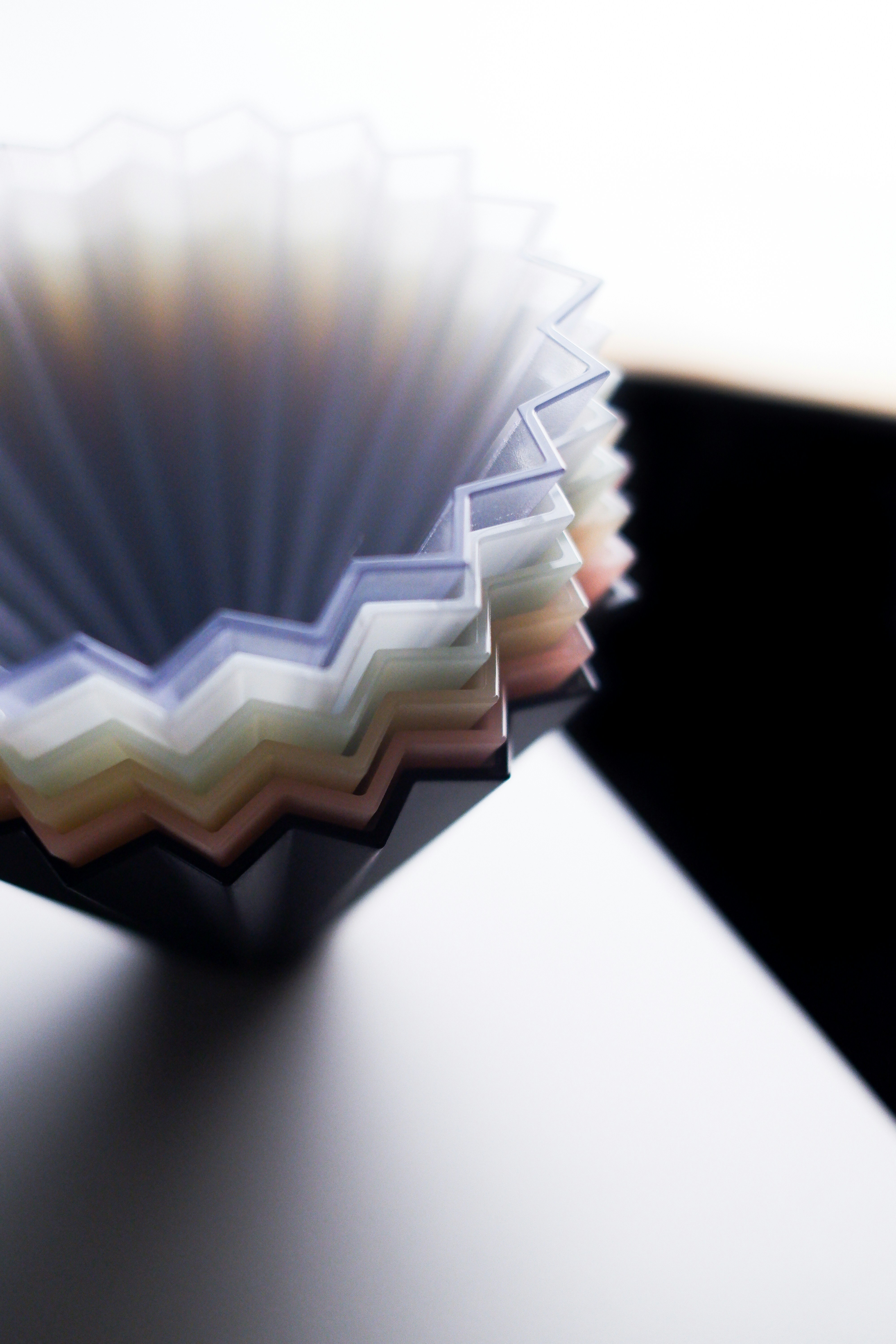 Coiled Spectrum: A Nest of Colored Weaves in Focus