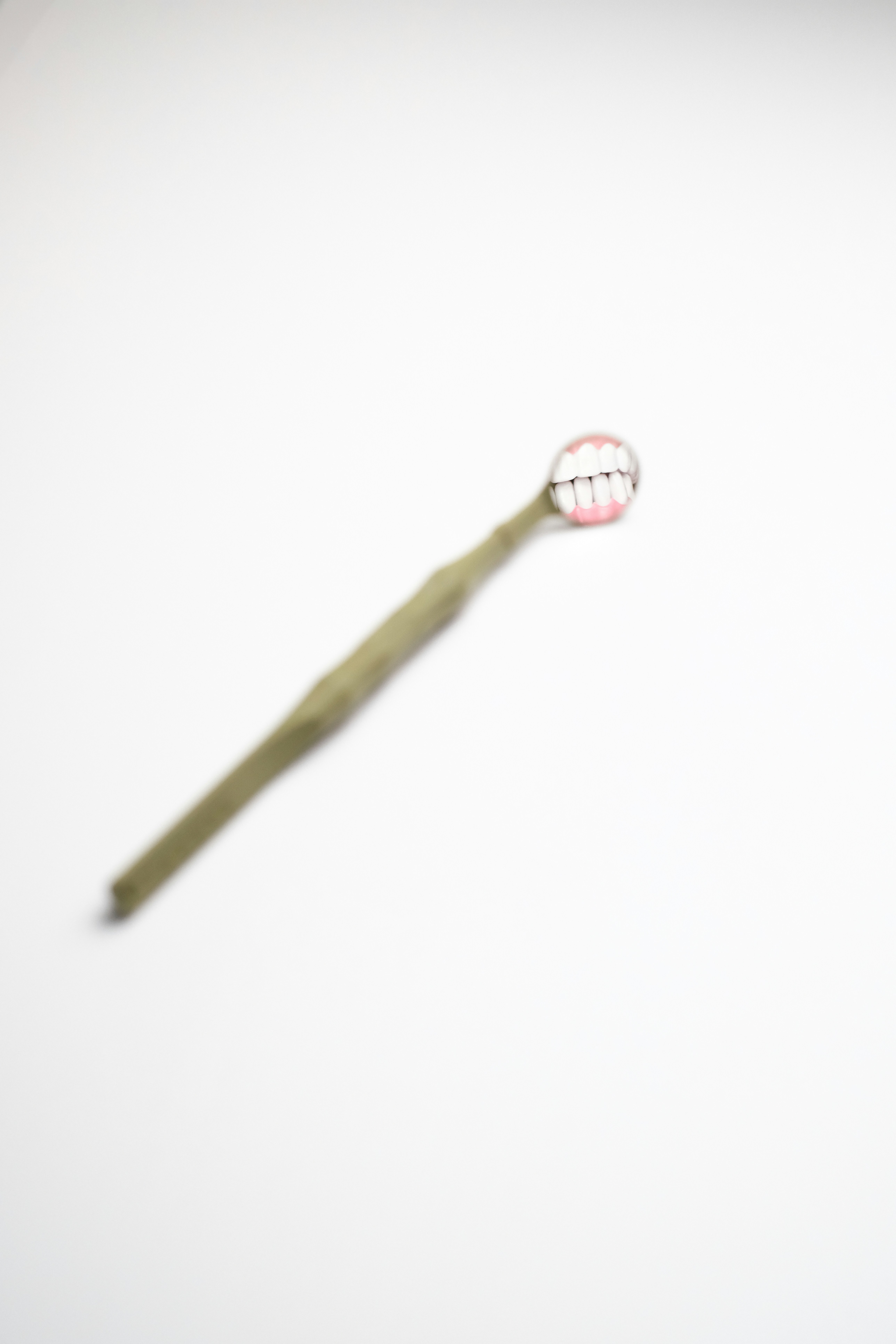 Whimsical Dental Tool with a Smile
