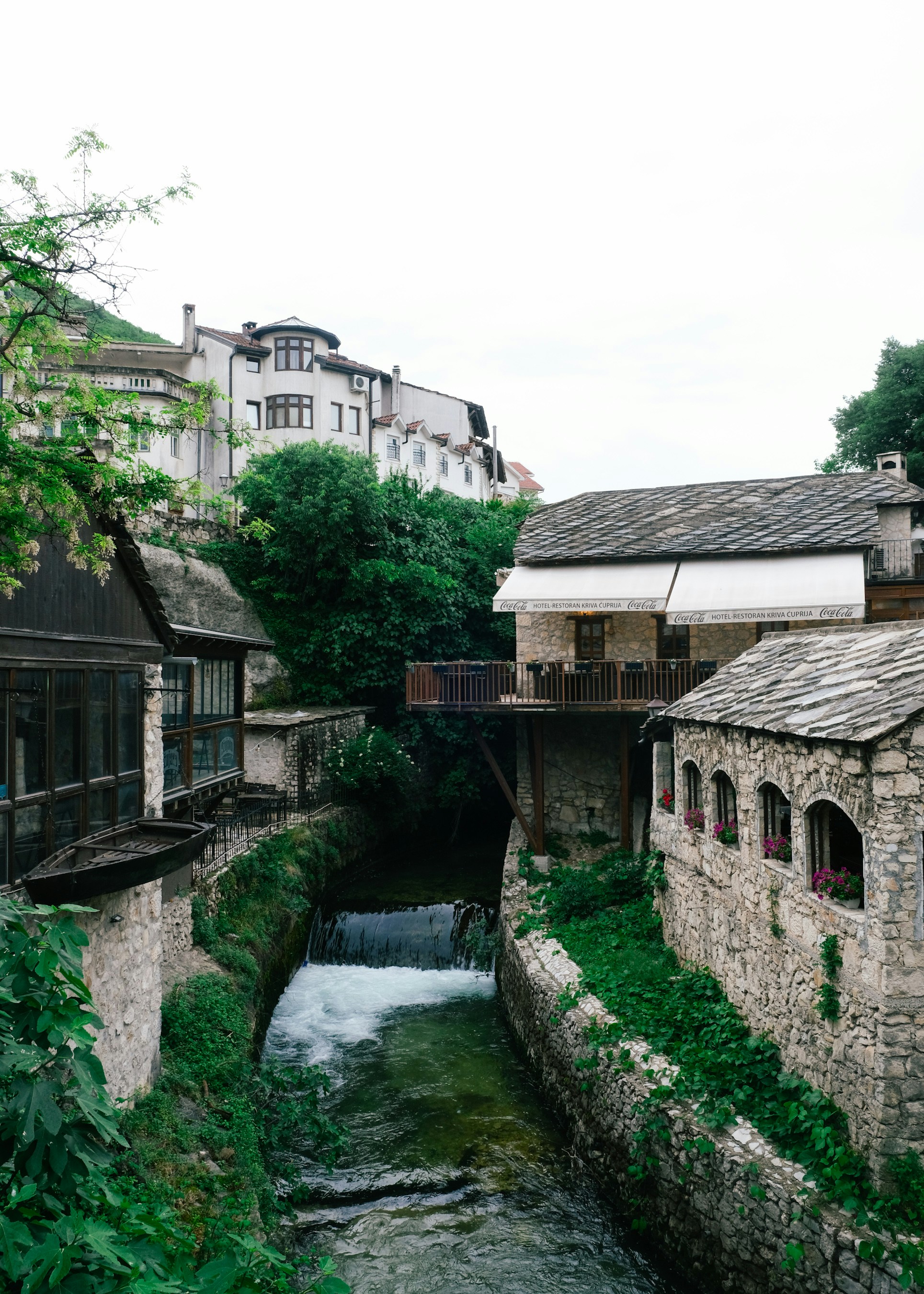 Bridge of Quiet Currents: A Stone-Village Crossing Over a Babbling Creek