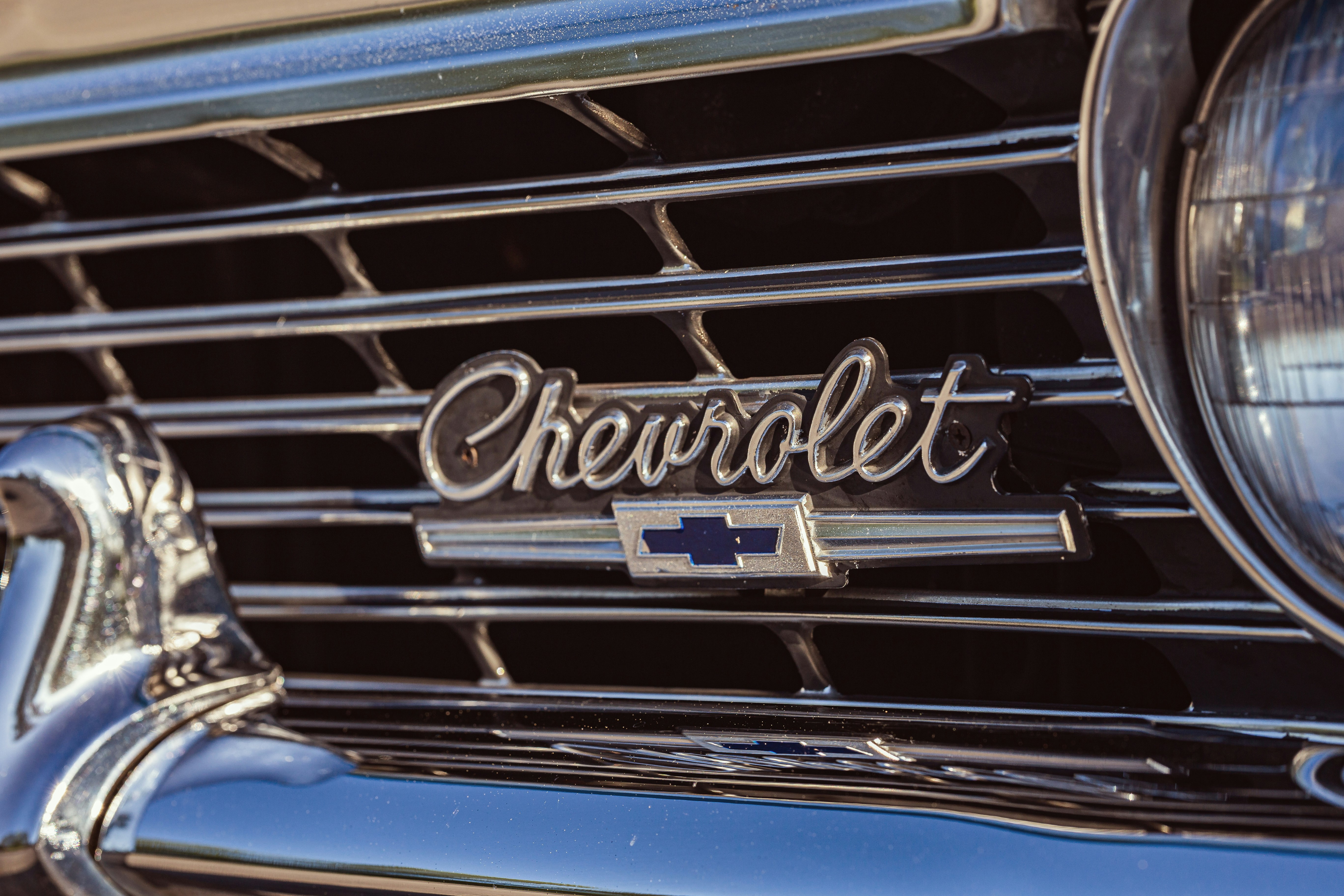 Chrome Crest: Close-Up of a Vintage Chevrolet Grille