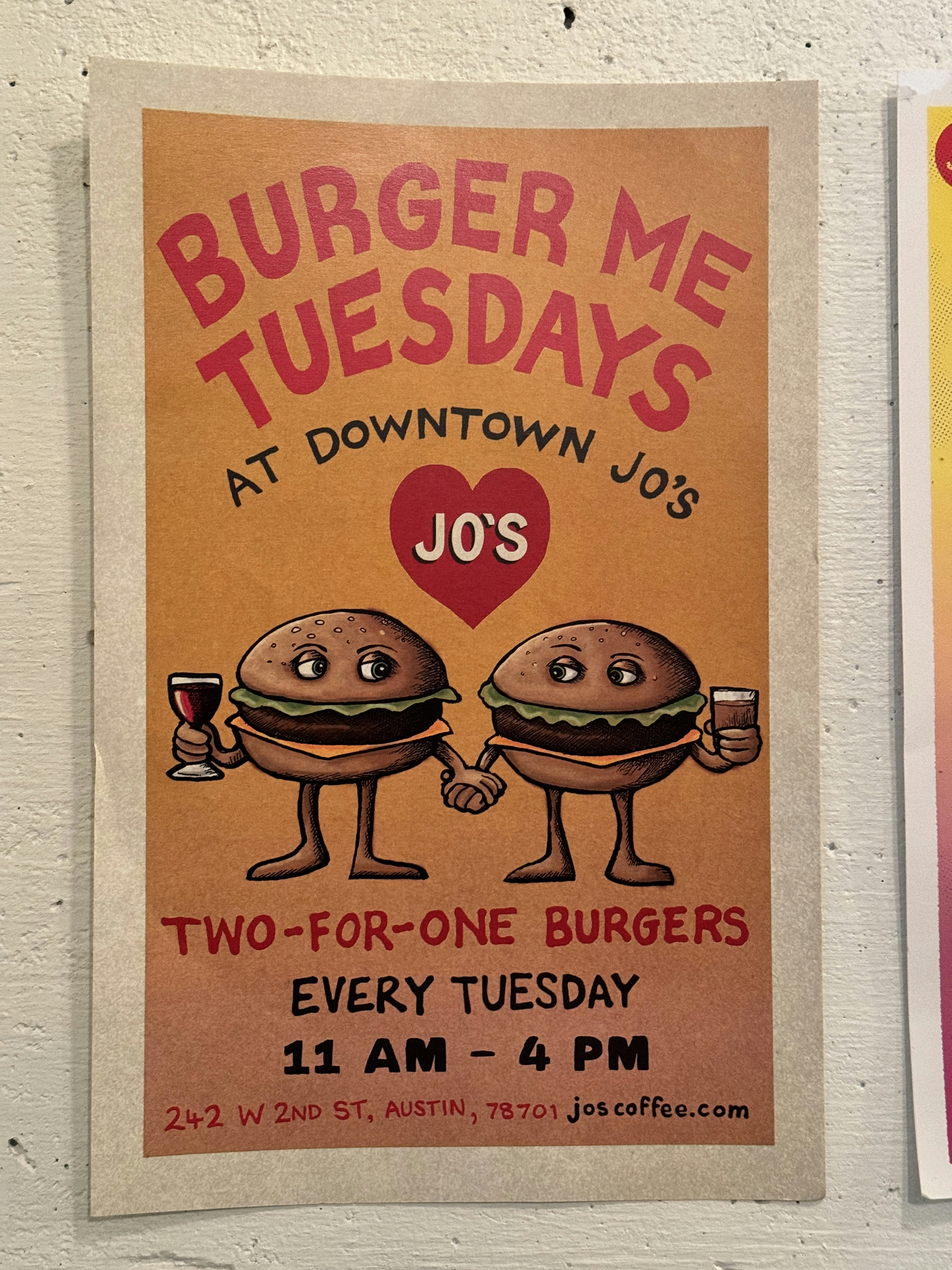 Two-for-One Burgers Tuesday: Hand-Drawn Promo on a Downtown Wall