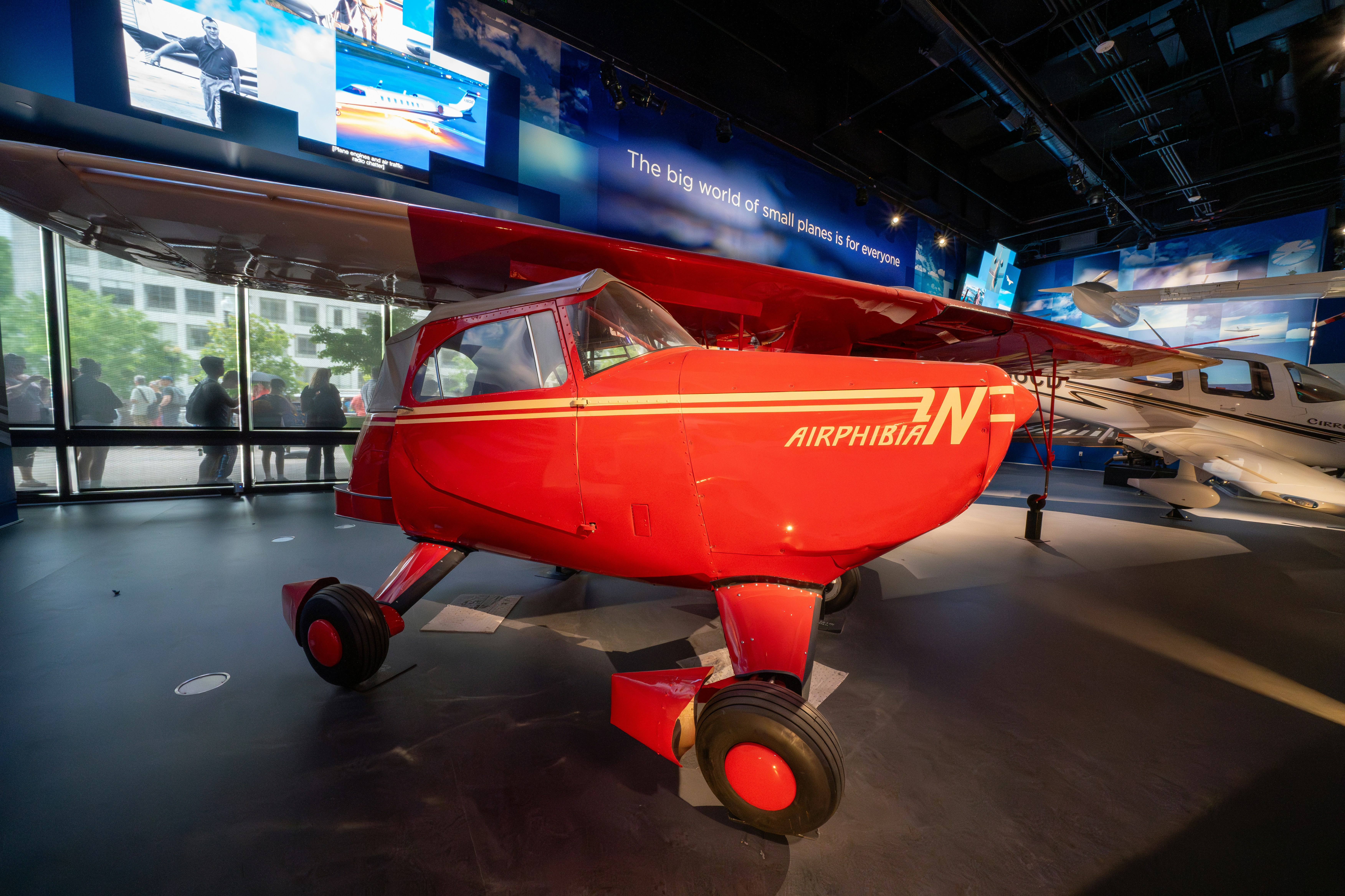 A small red plane is on display in a museum photo – Free Smithsonian ...
