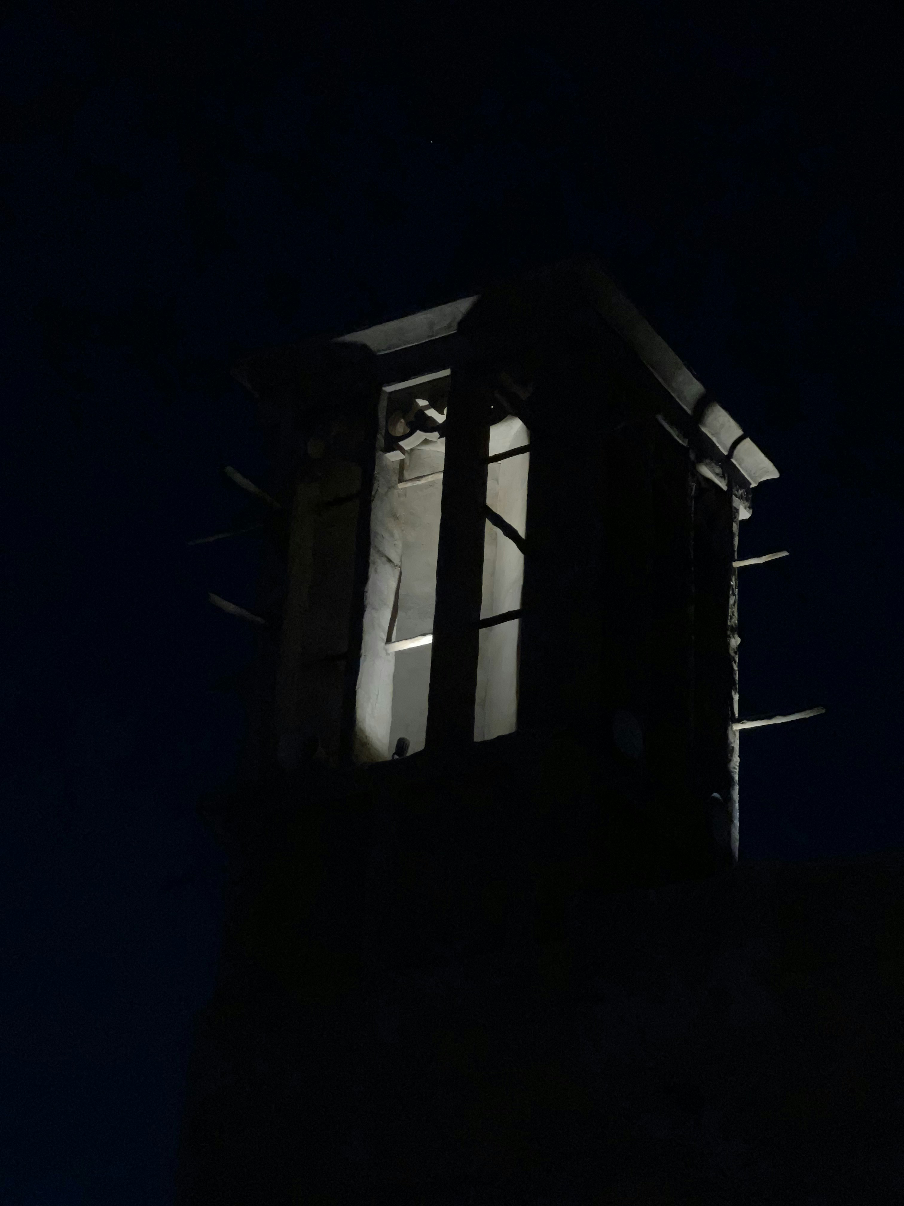 Glow Through Timber: Night-Tower Chamber