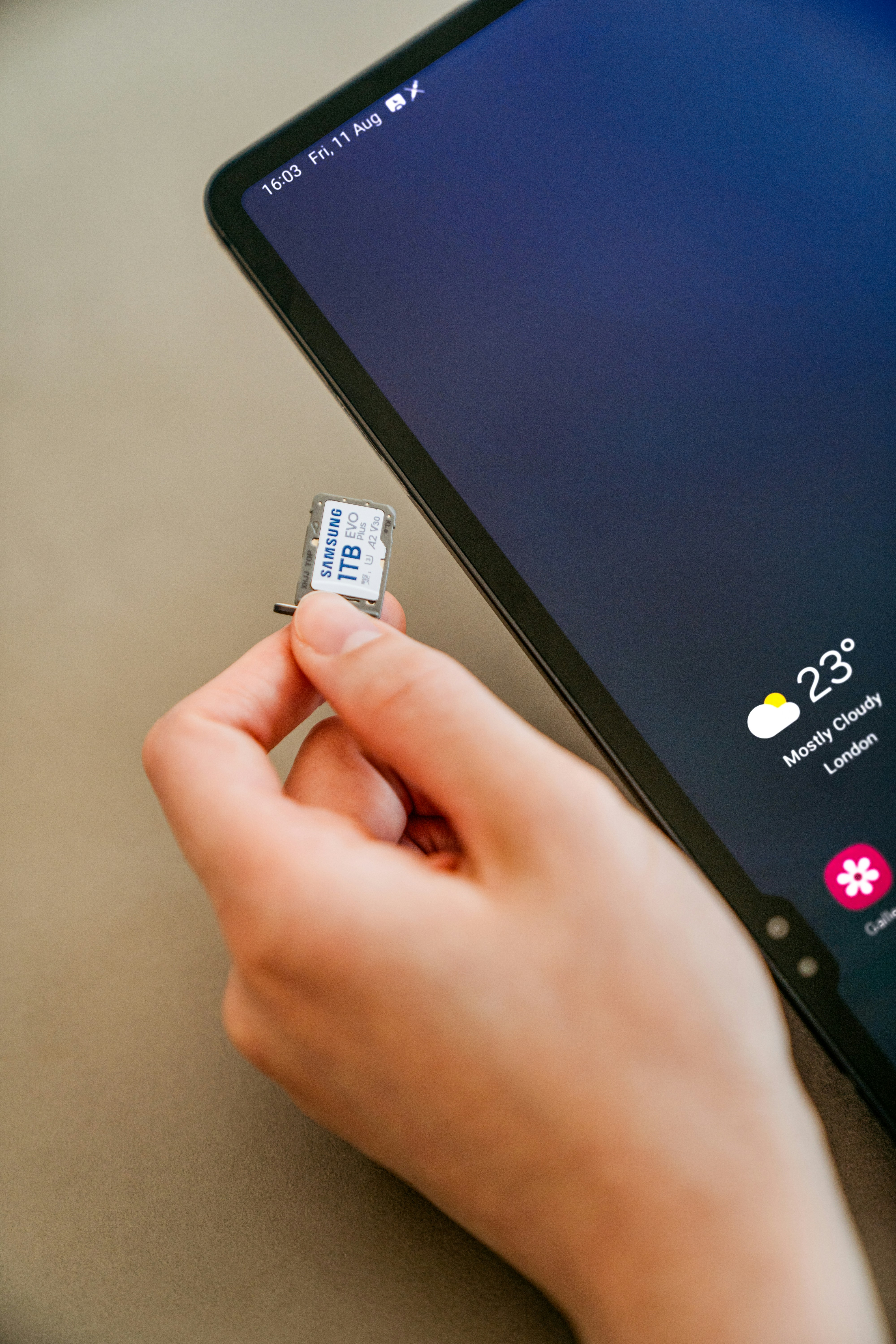 A person is holding a micro device in their hand photo – Free Memory ...